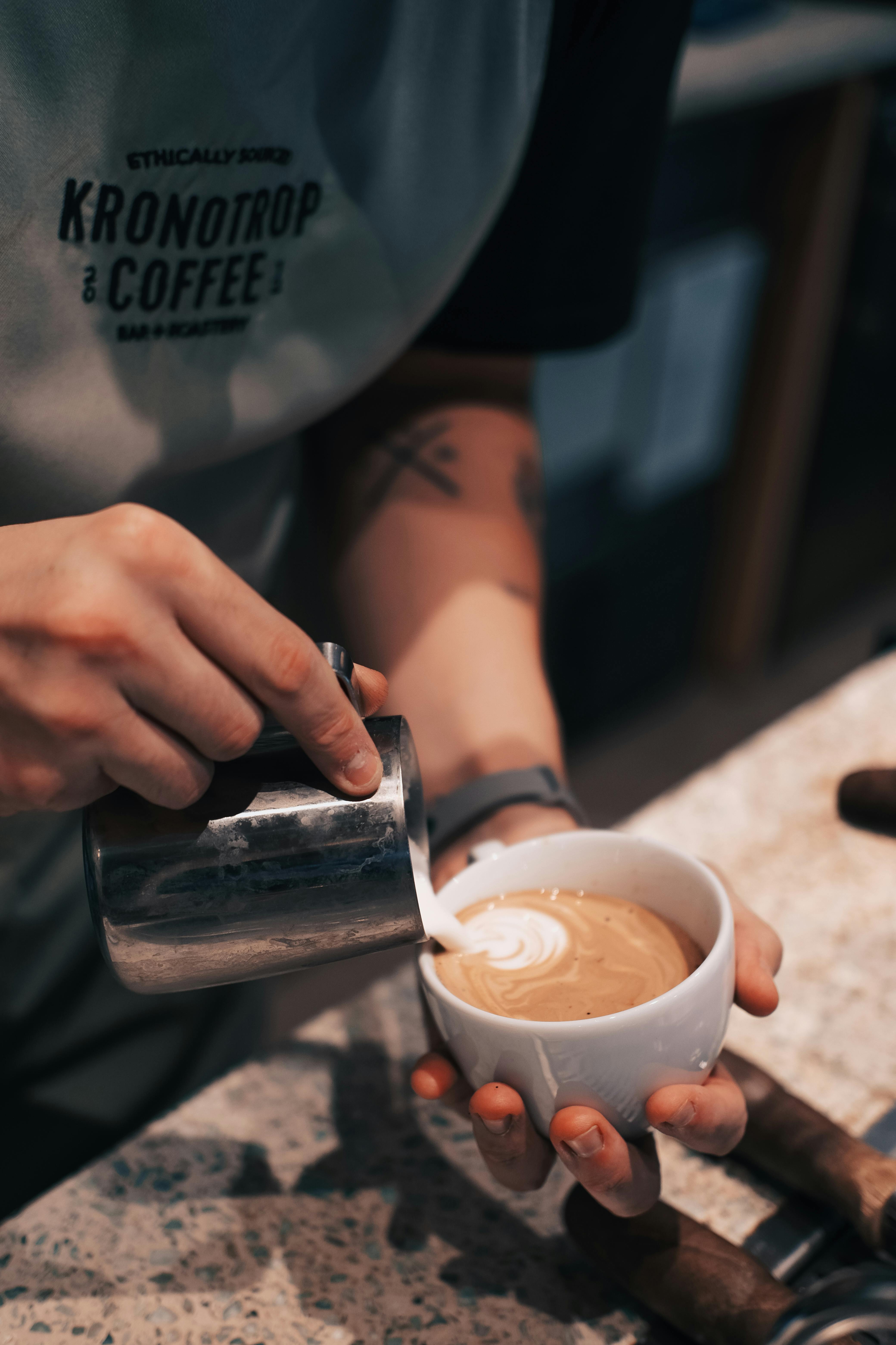 Person Making Latte Art · Free Stock Photo