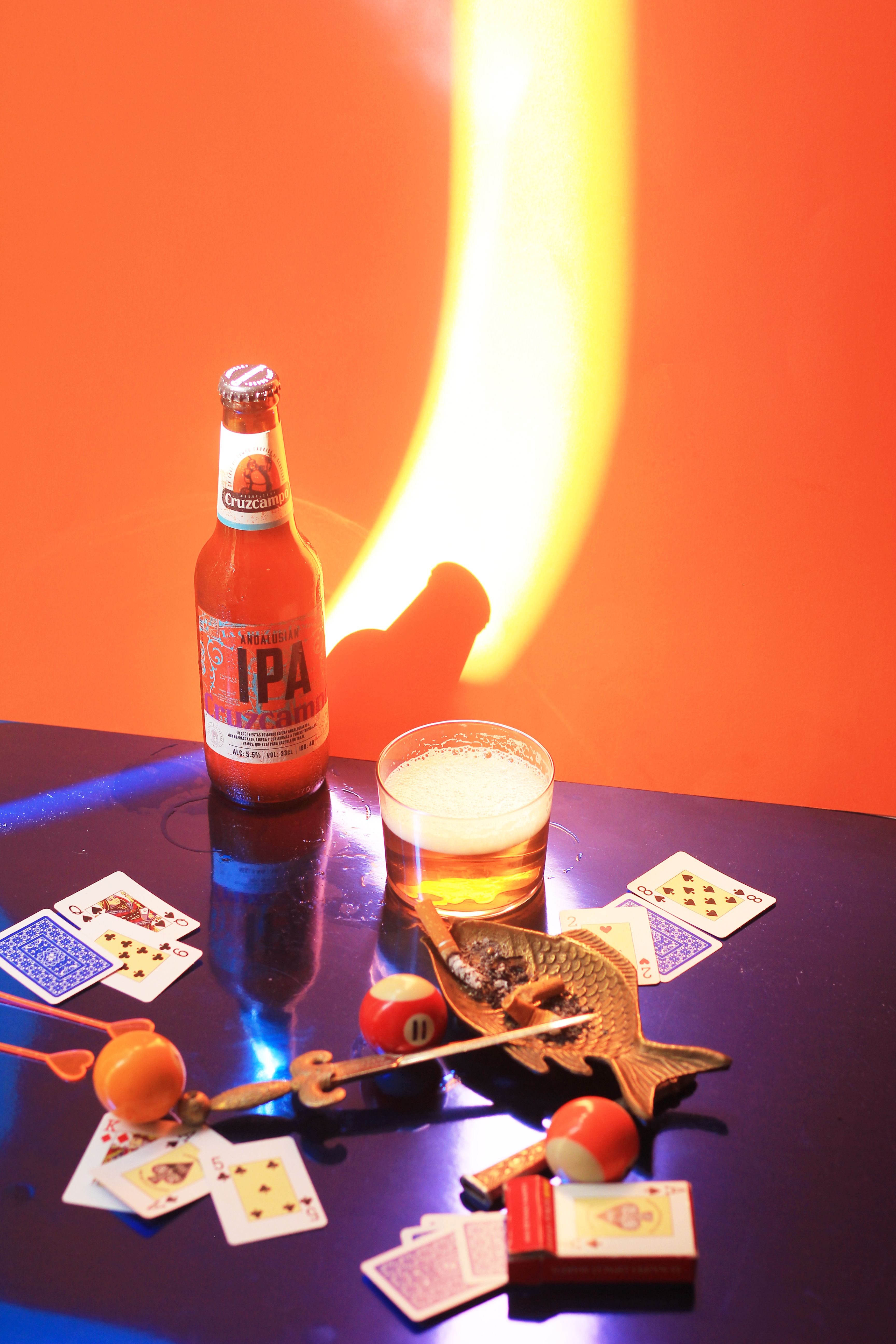 Beer Bottle, Glass, Cards and Toy Sword · Free Stock Photo