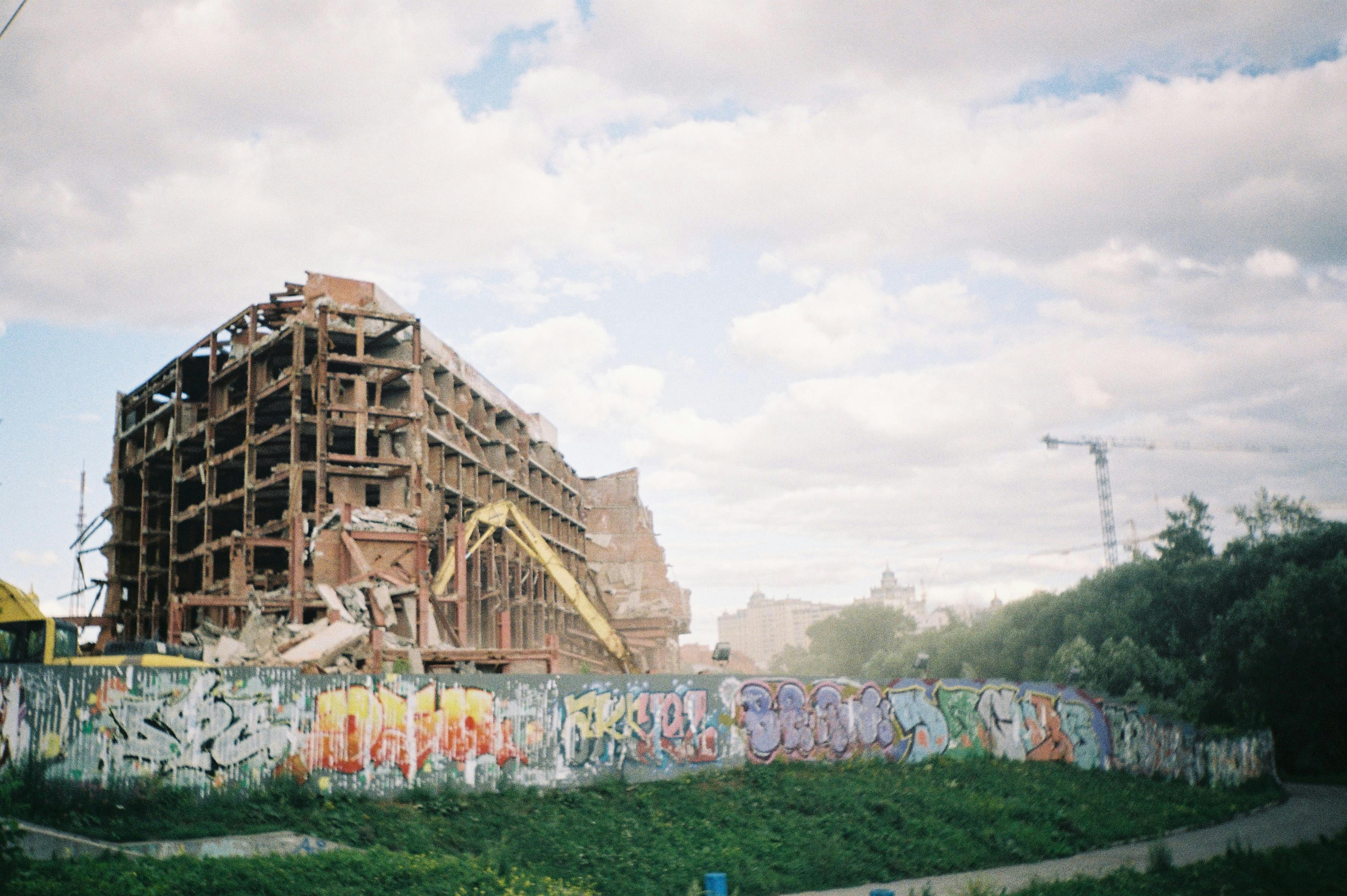 Graffiti Wall Beside Ruined Building · Free Stock Photo