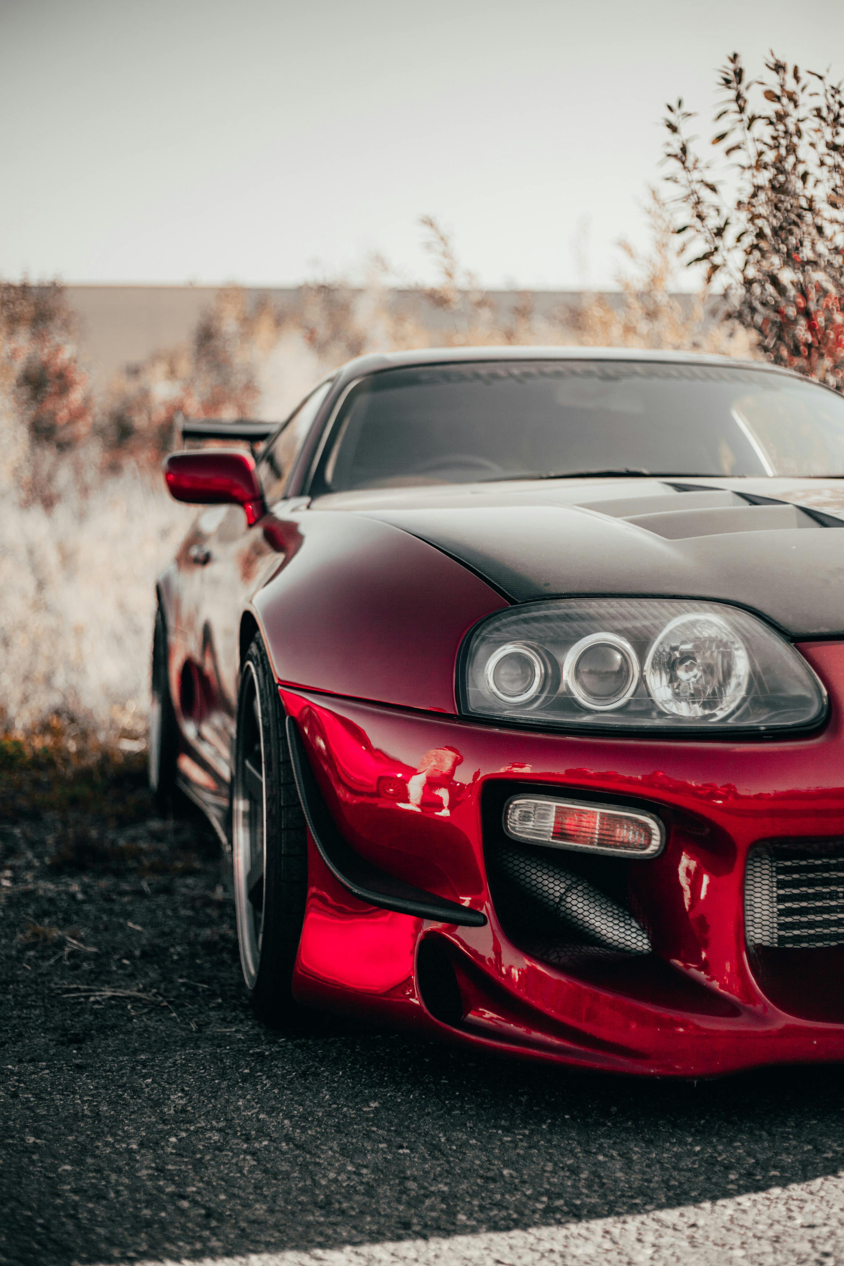 Back View of a Red Sports Car · Free Stock Photo