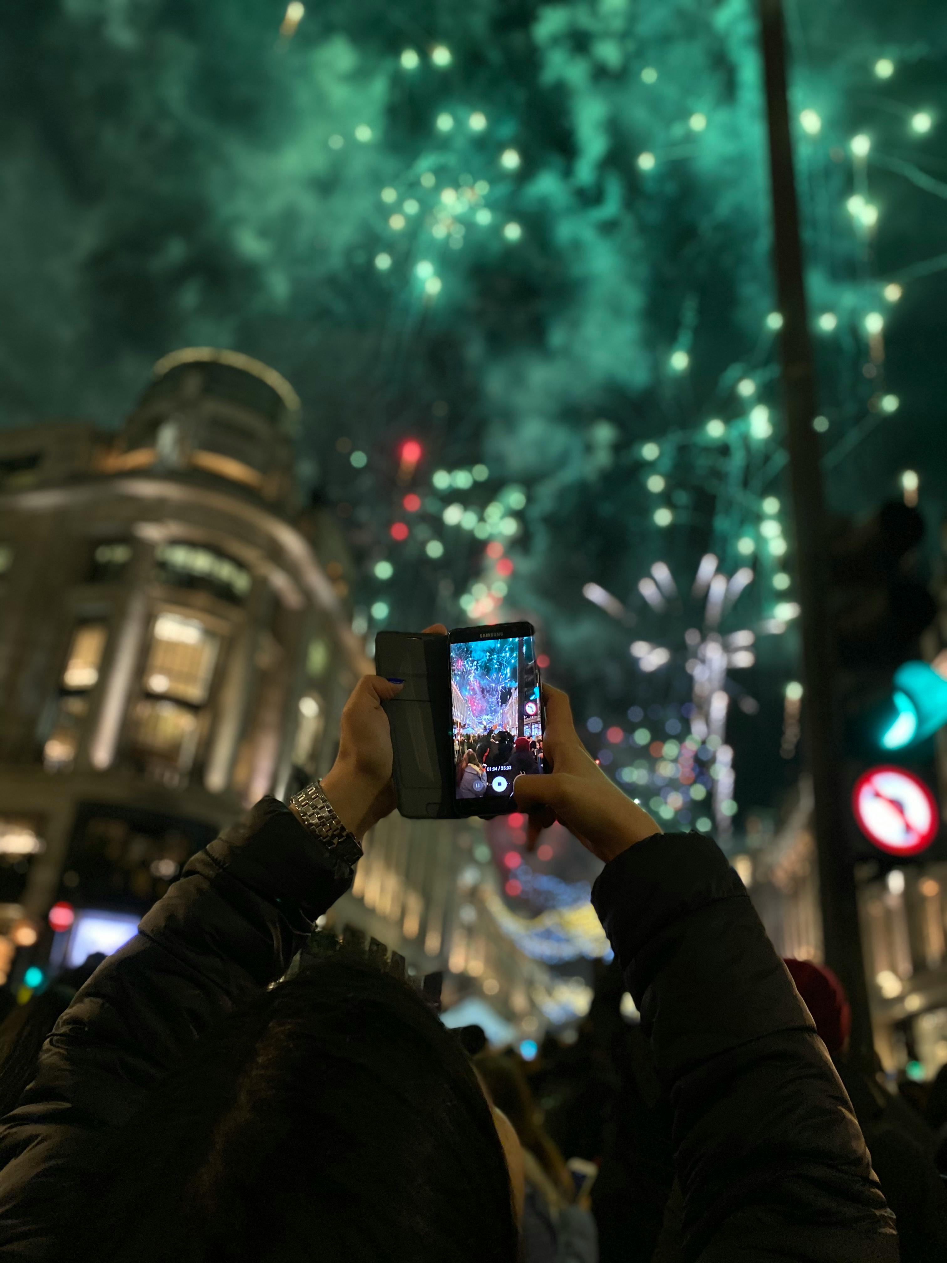 Woman Recording Video Waving at Phone · Free Stock Photo