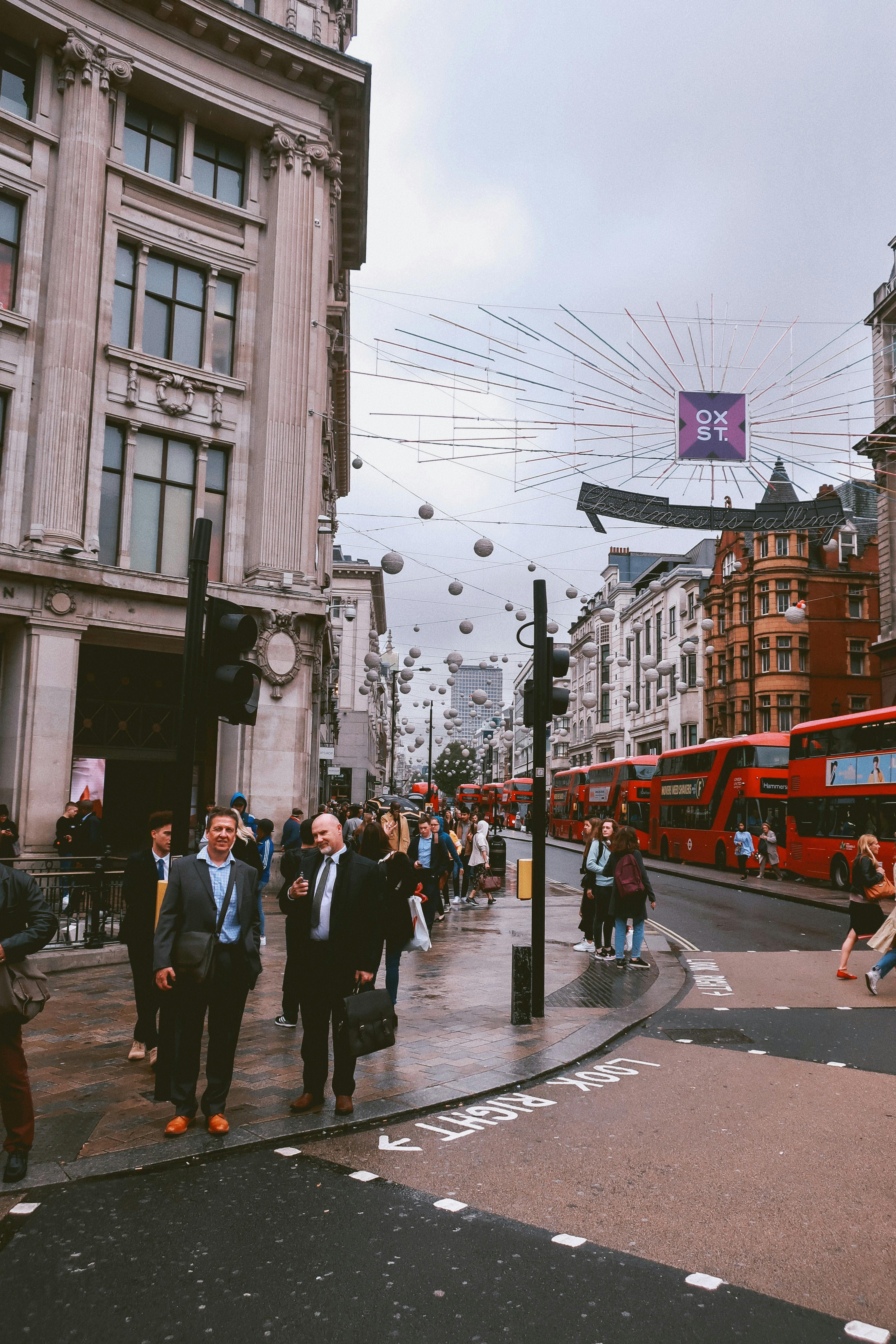 People Walking on a Busy Pavement · Free Stock Photo