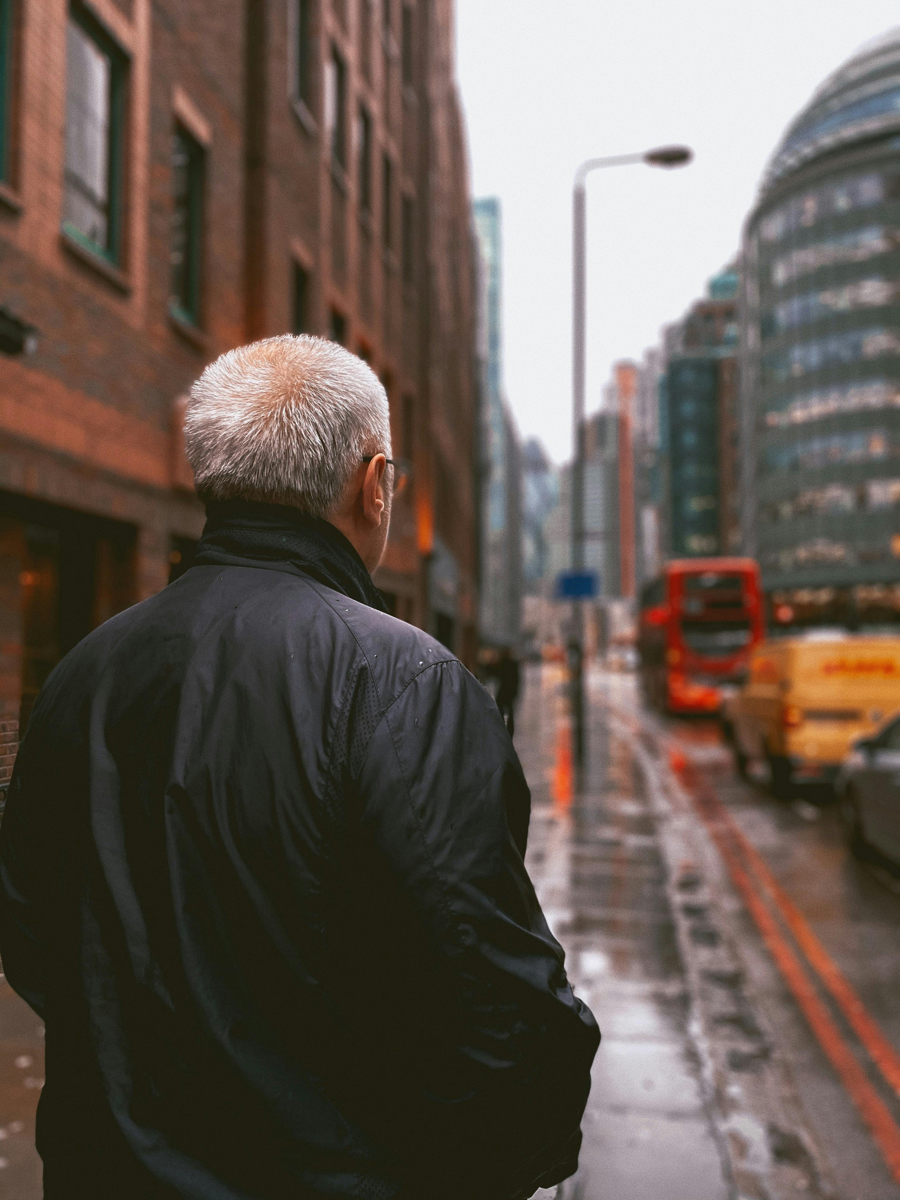 Back of a Man Looking over the Sea · Free Stock Photo