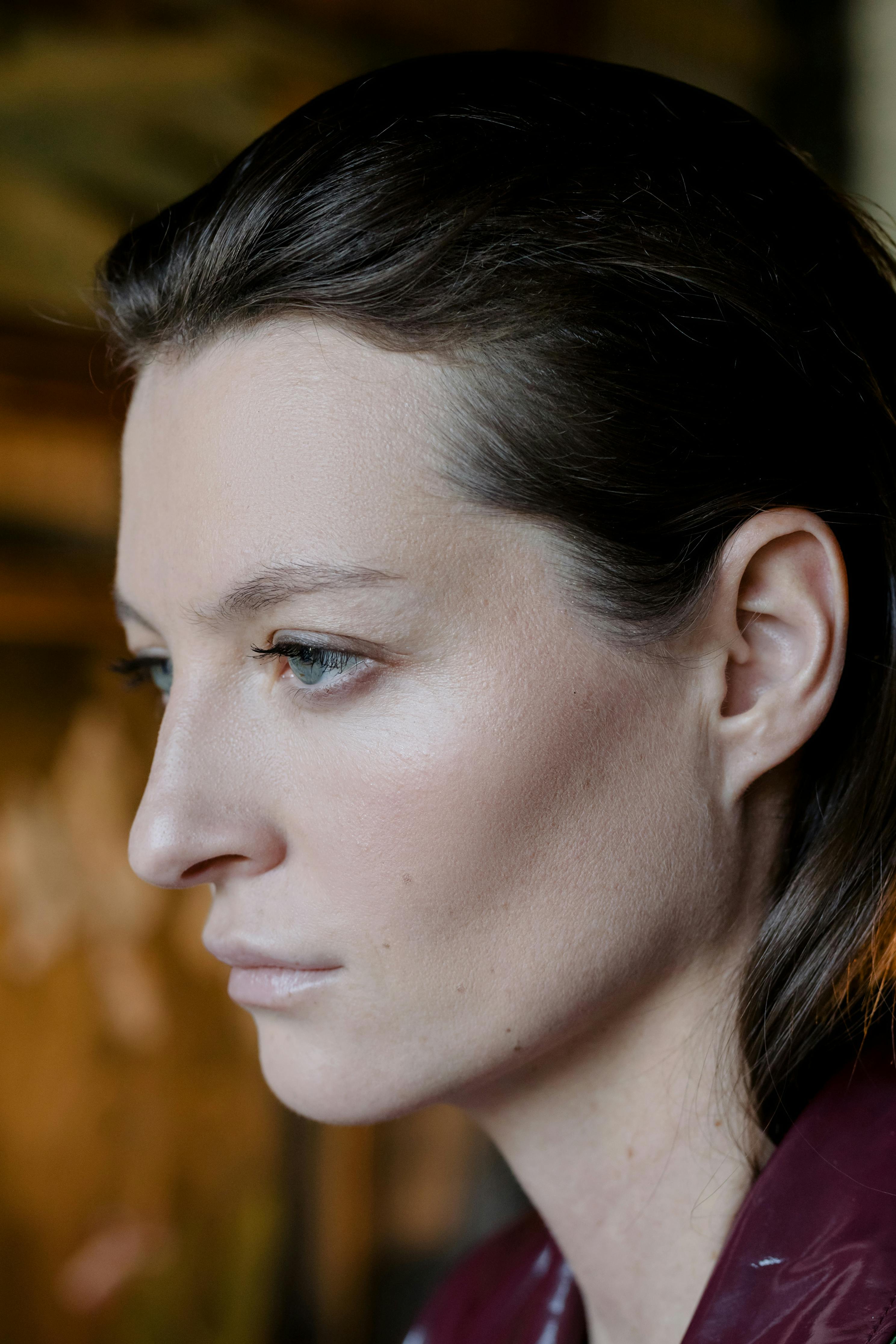 A Sideview Face of a Woman in Close-up · Free Stock Photo