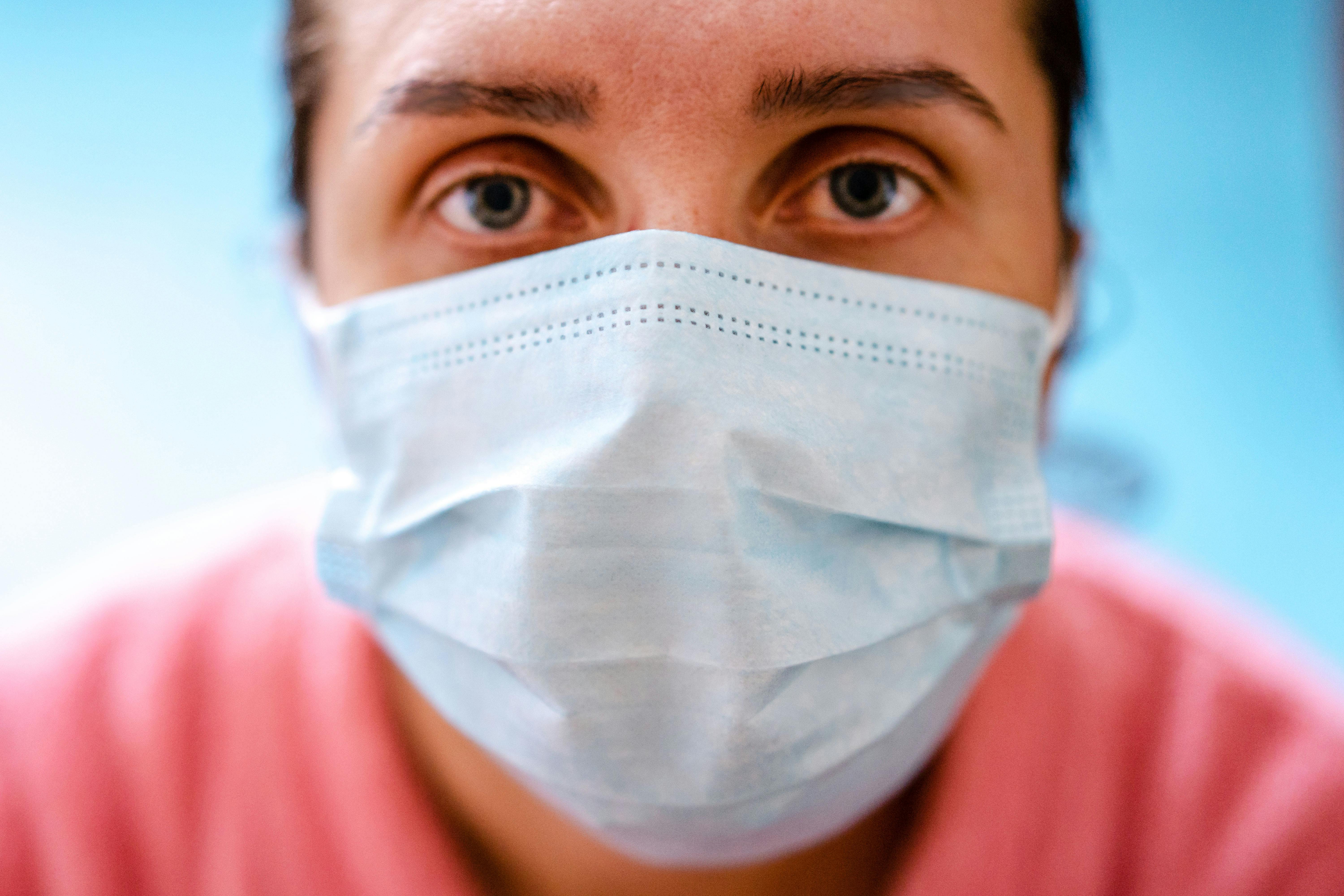 Close-Up Shot of Stacks of Face Masks · Free Stock Photo