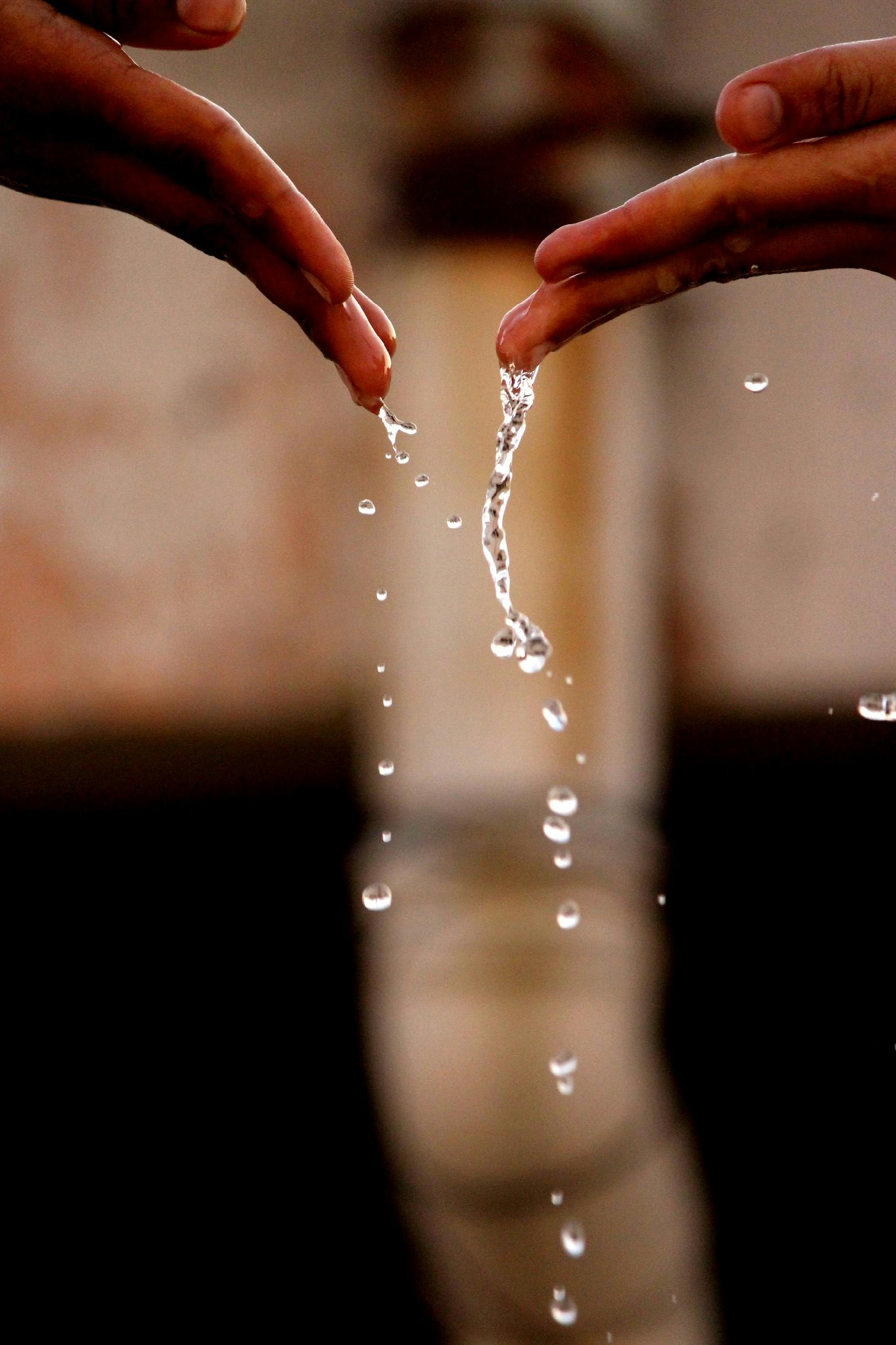 Hands With Drops Of Water · Free Stock Photo