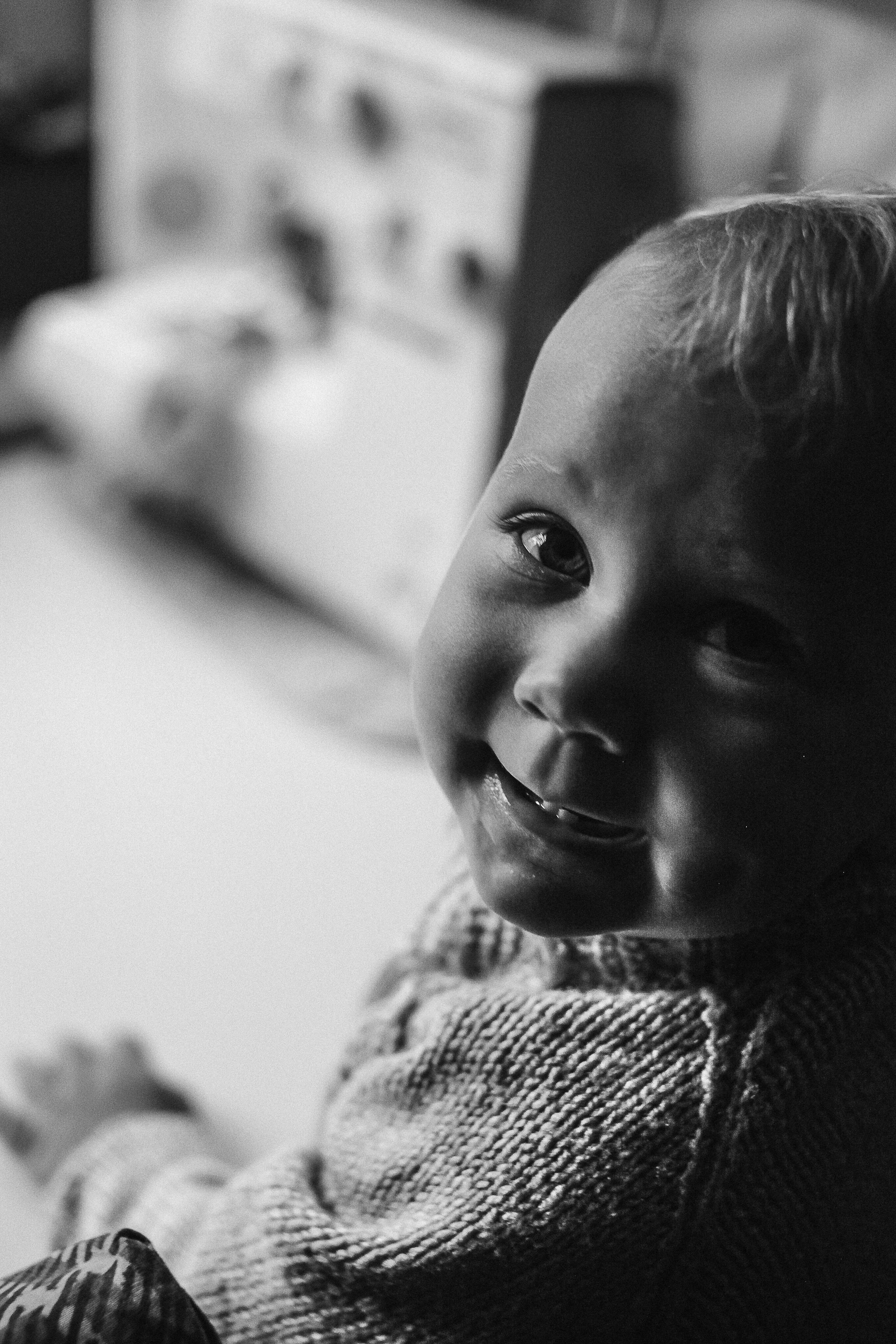 Grayscale Photo of a Smiling Baby · Free Stock Photo