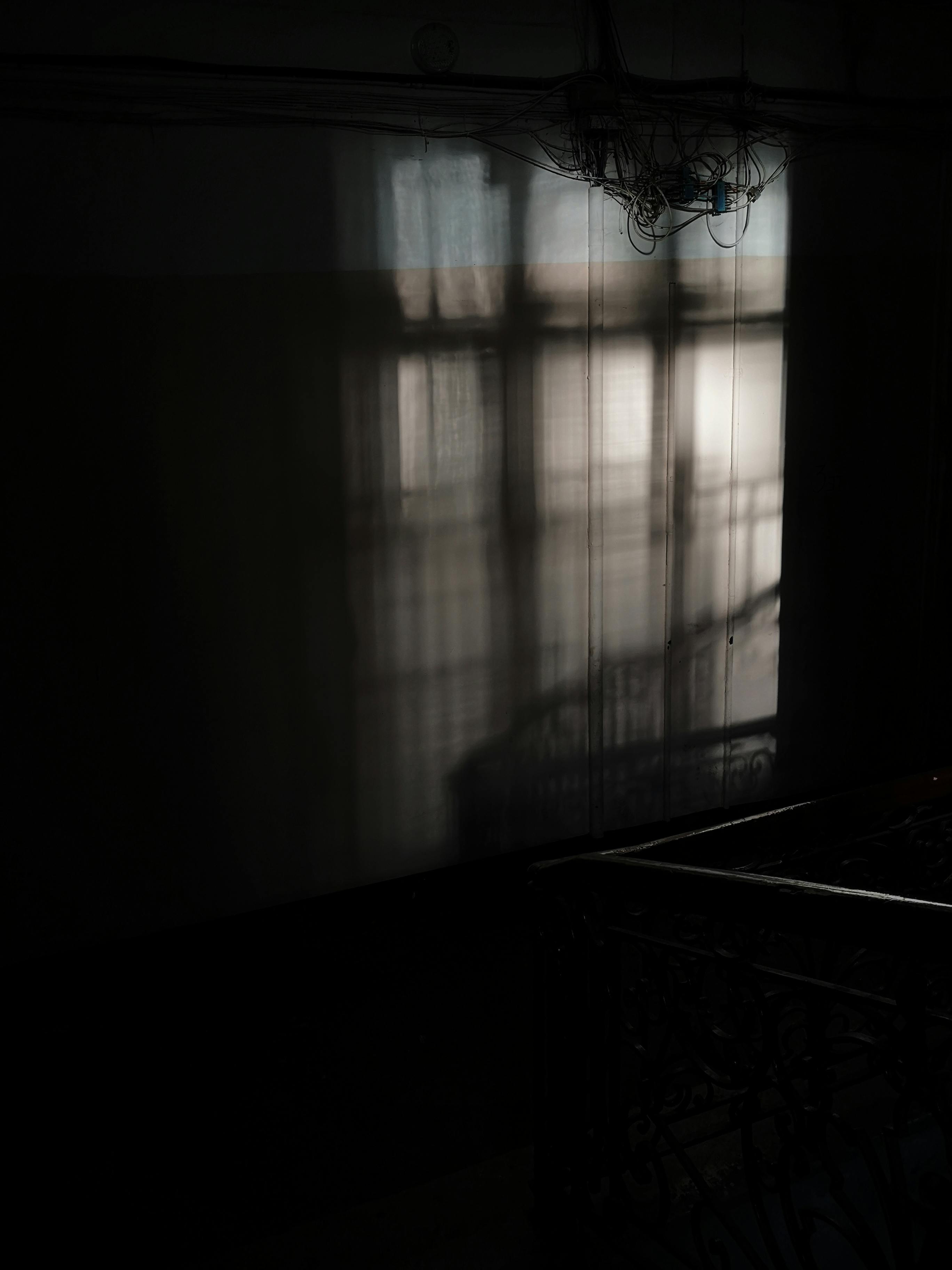 Woman Face in Shadow behind Curtain on Windows · Free Stock Photo