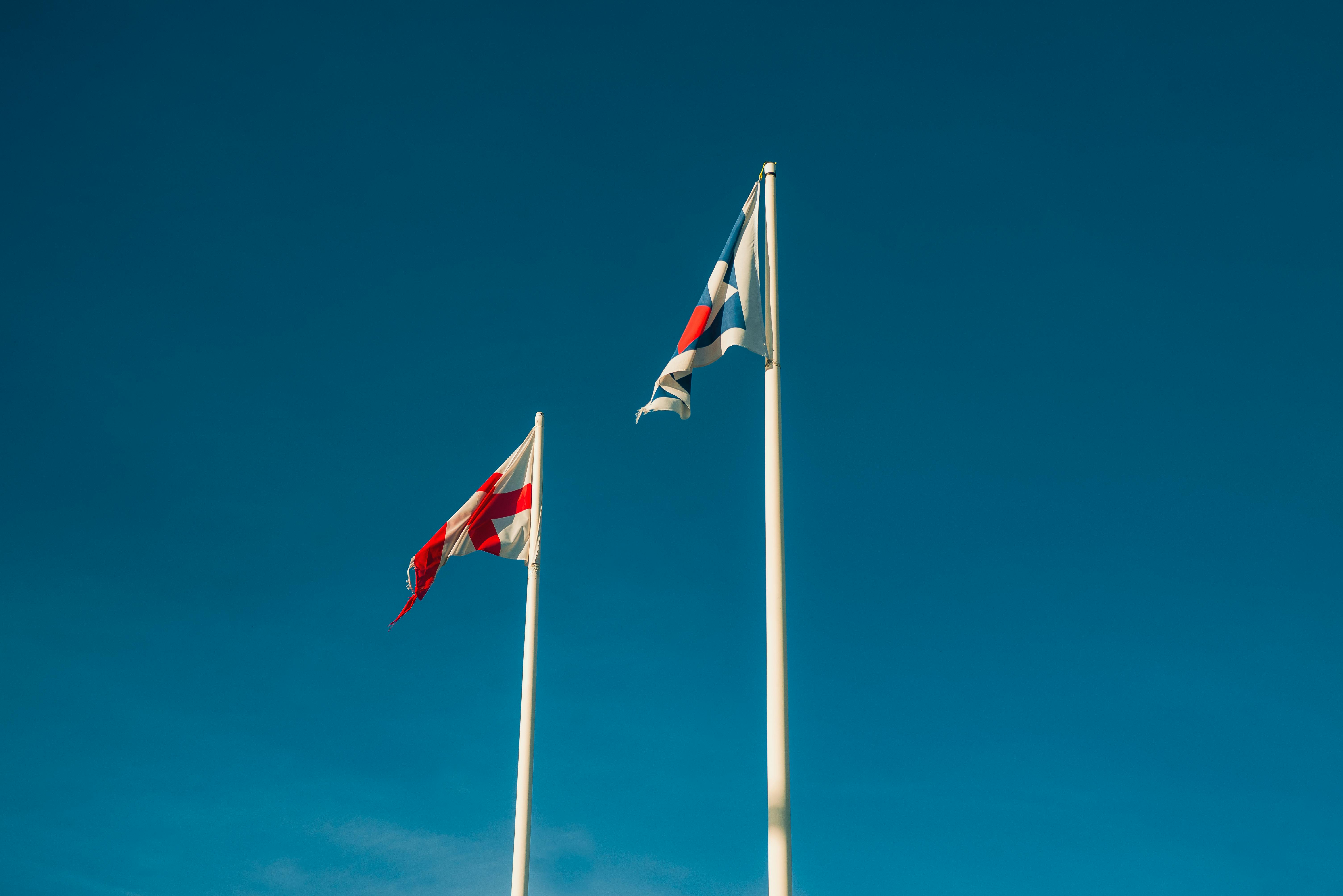 Multiple National Country Flags Waving on Poles · Free Stock Photo