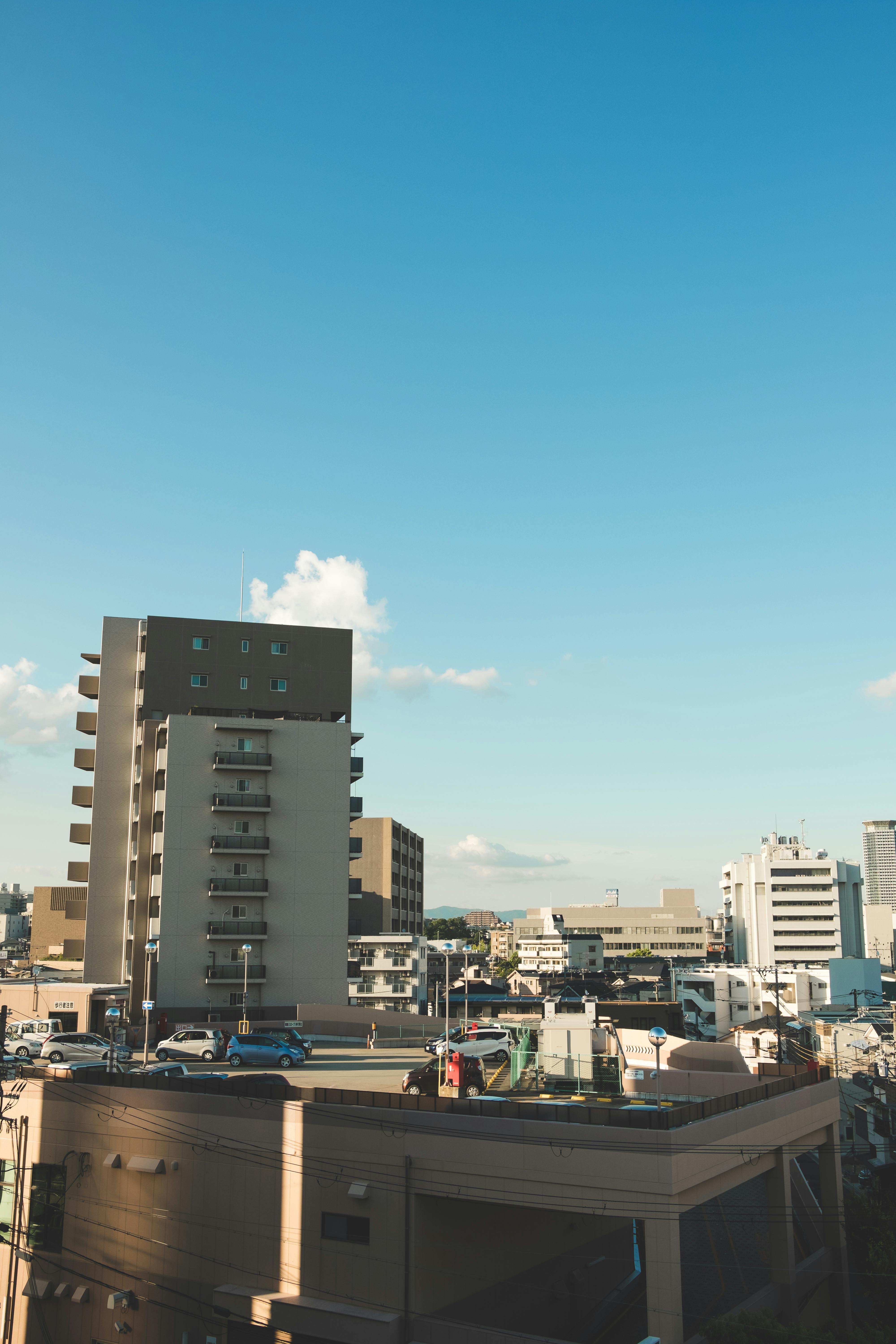 Cars Parked on a Building Roof · Free Stock Photo