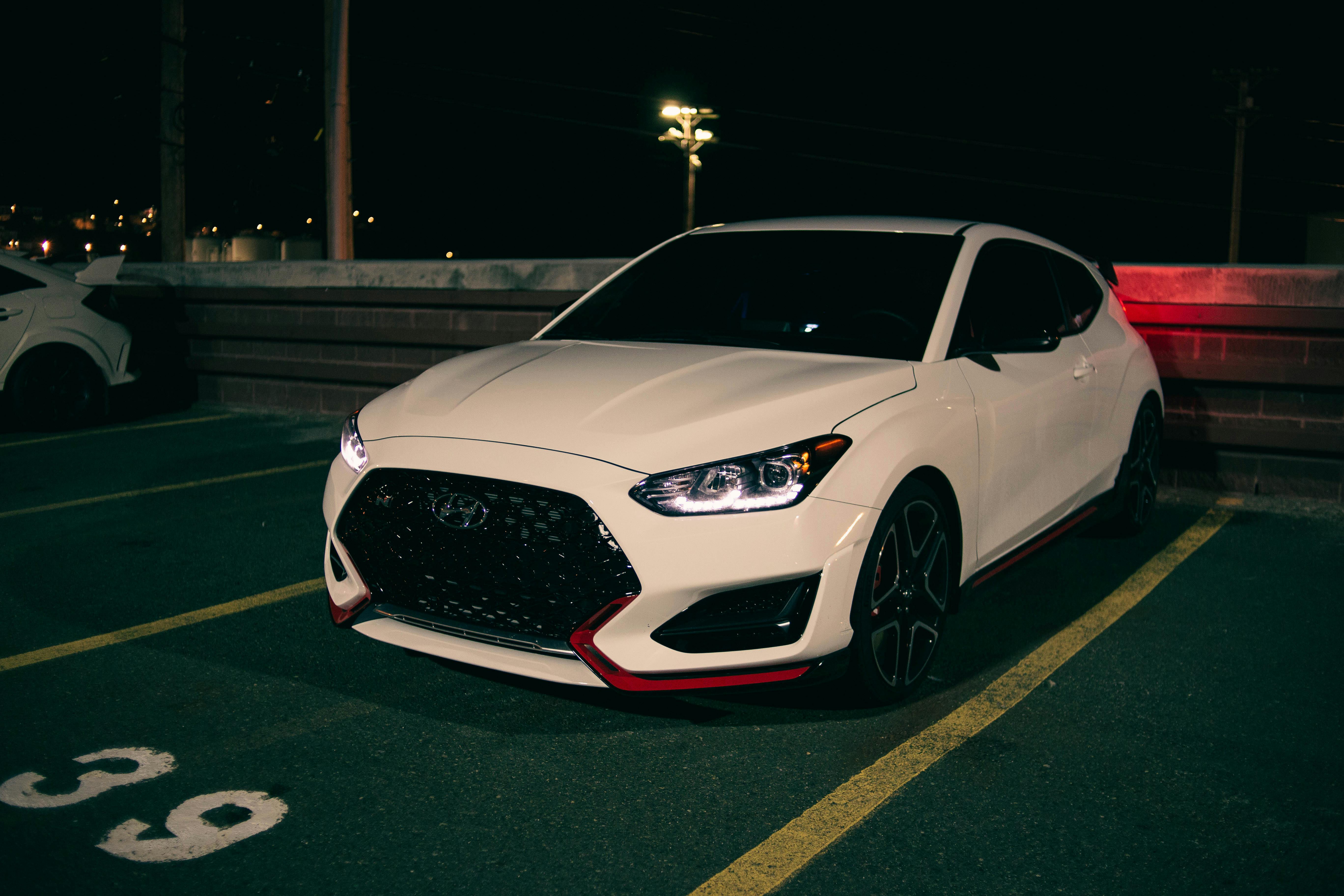 A White Hyundai Car on Parking Lot · Free Stock Photo
