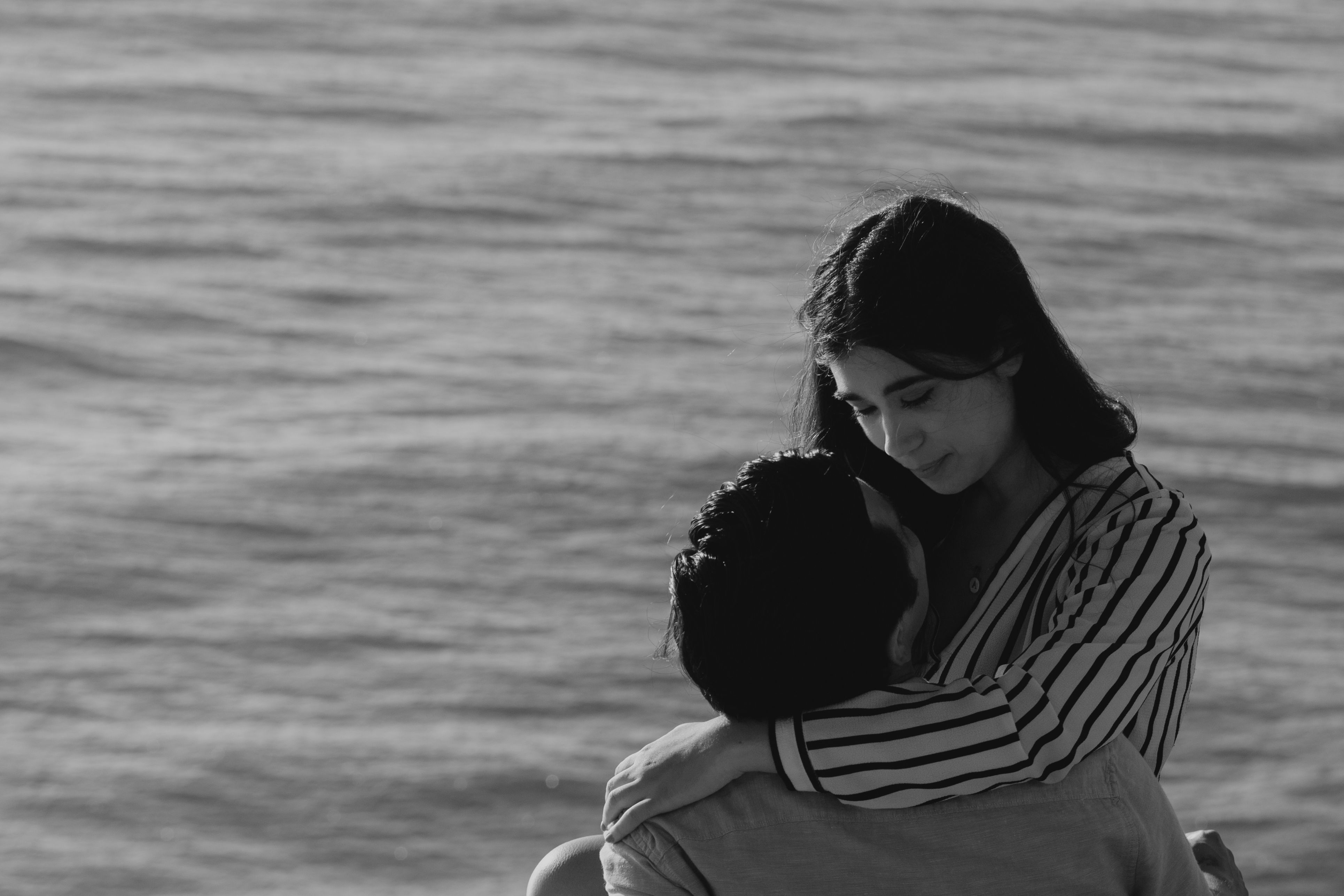 Monochrome Photo of an Intimate Couple · Free Stock Photo