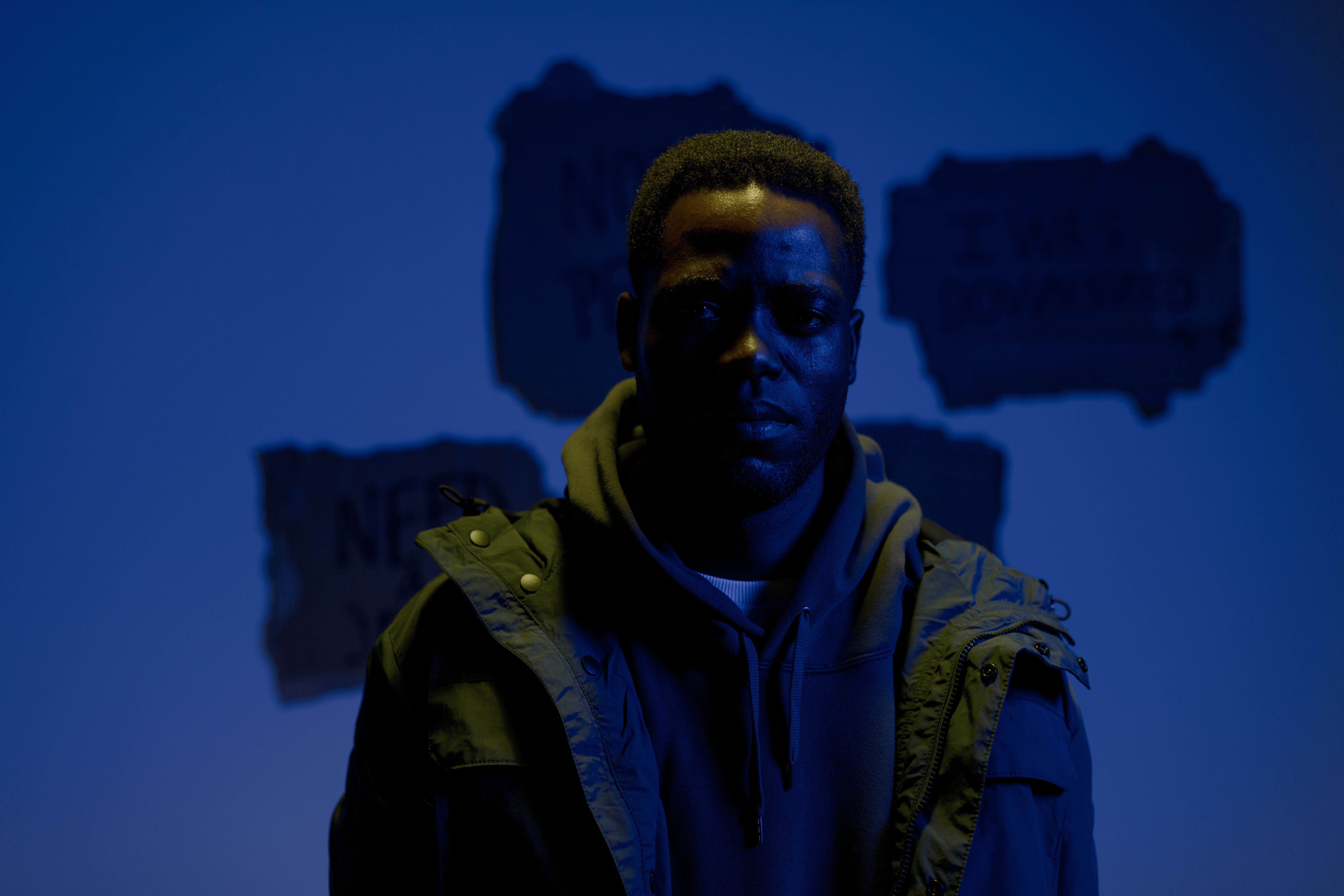 Man in Jacket on Blue Lighting · Free Stock Photo