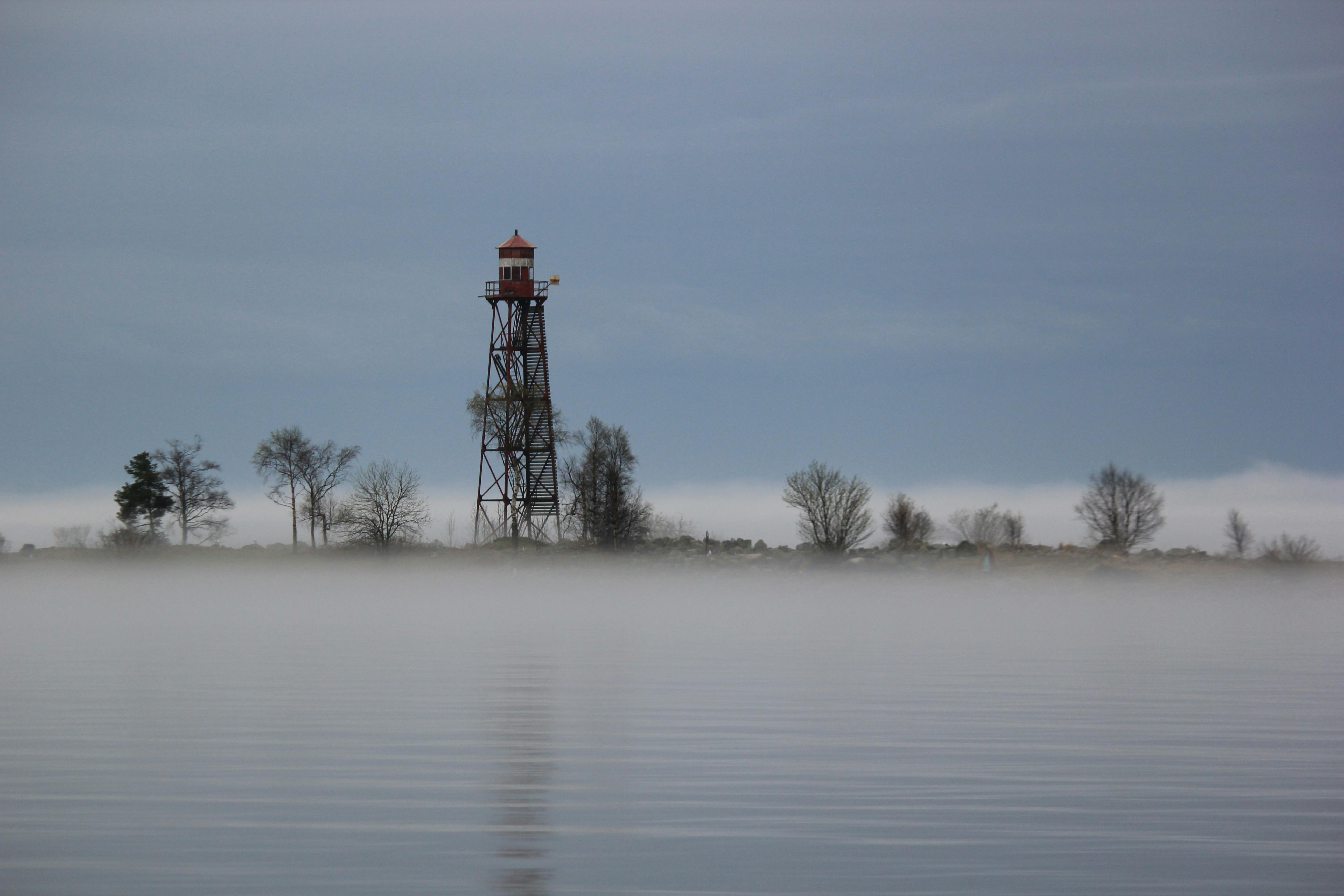 Old Watchtower on Shore of Misty Lake · Free Stock Photo