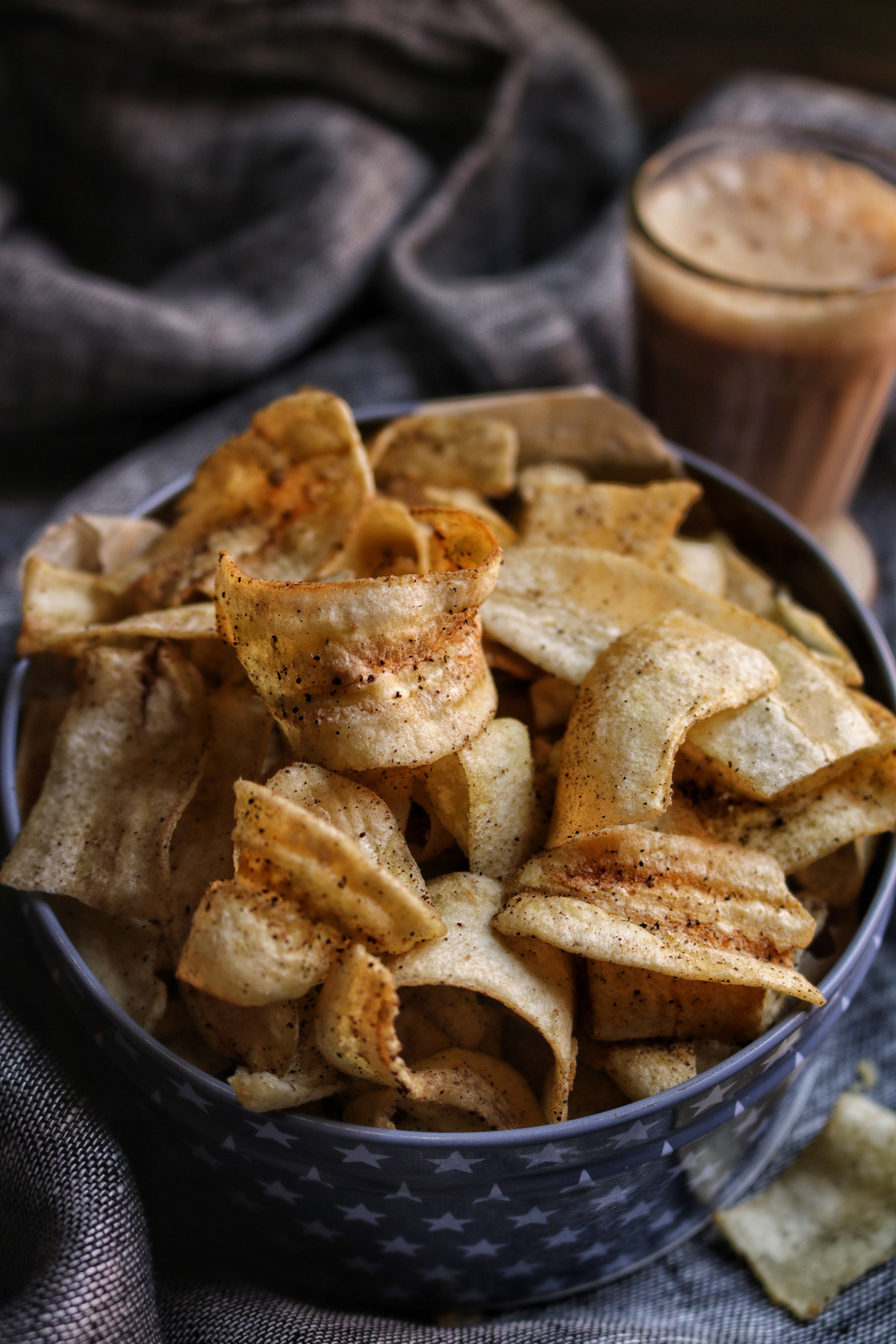 Woman Eating Snacks at Table · Free Stock Photo