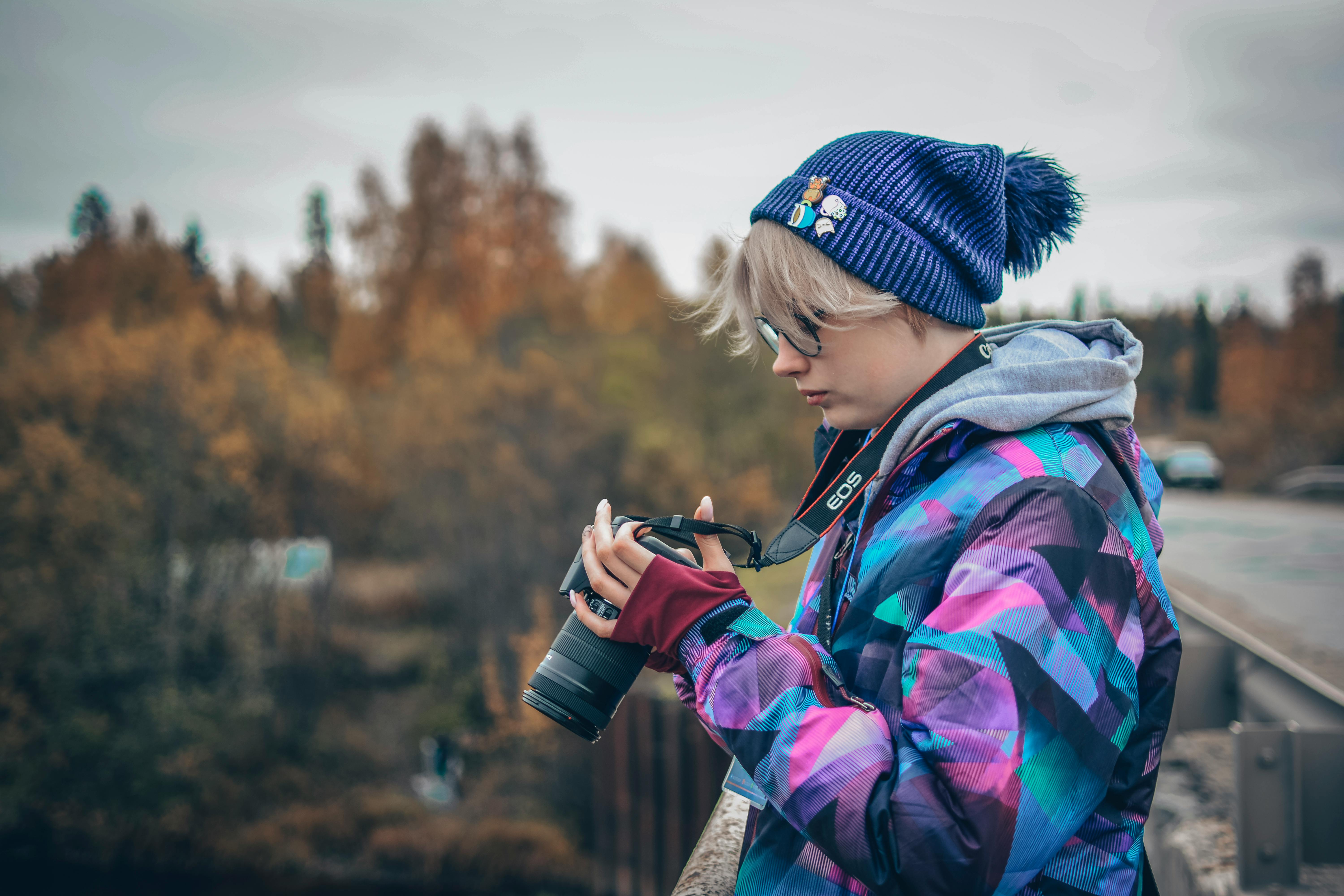 Woman Holding Camera · Free Stock Photo