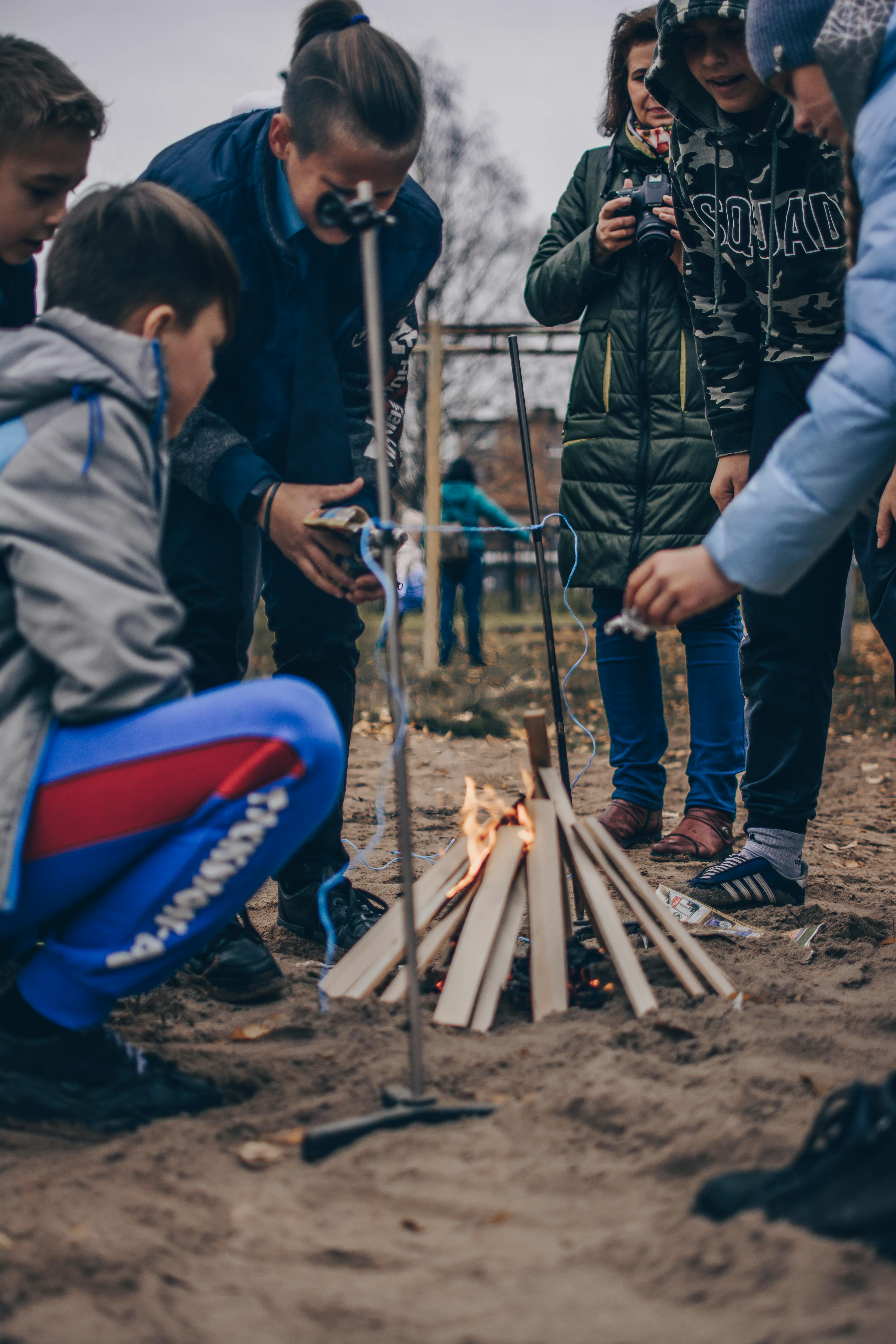 Teacher and Group of Students Having Bonfire · Free Stock Photo