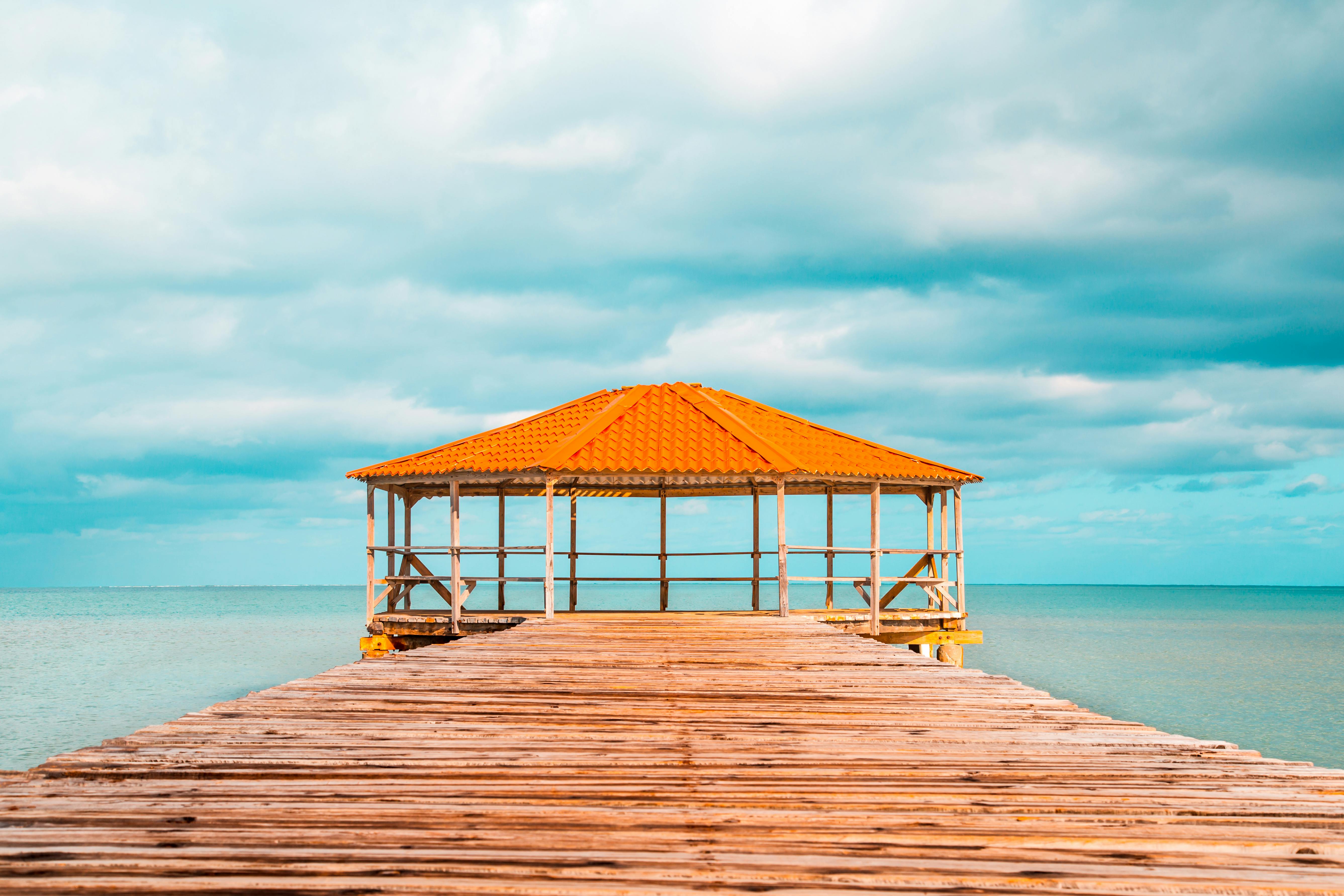 Beach and Hut during Daytime · Free Stock Photo