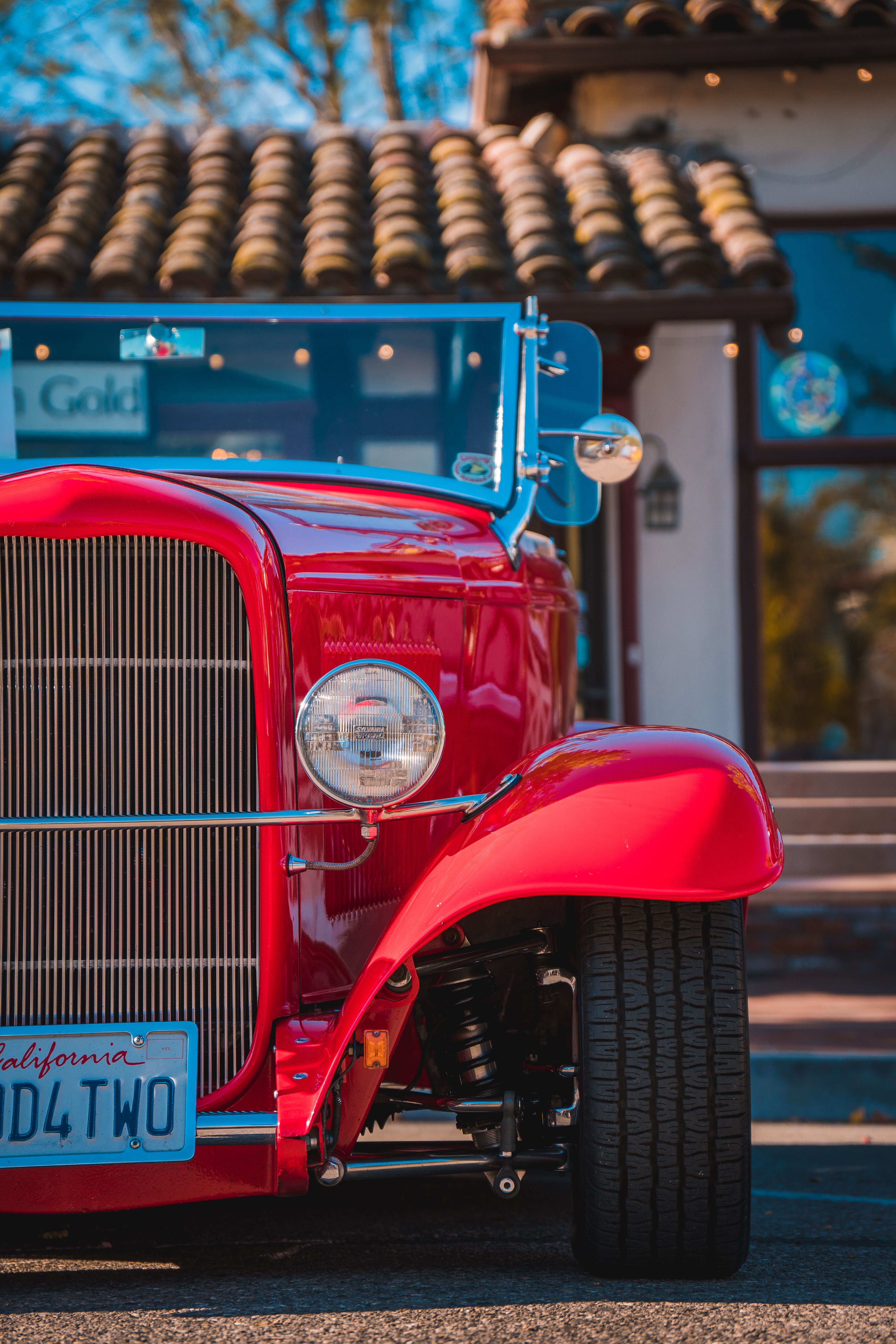 Red Car on Brown Pavement · Free Stock Photo