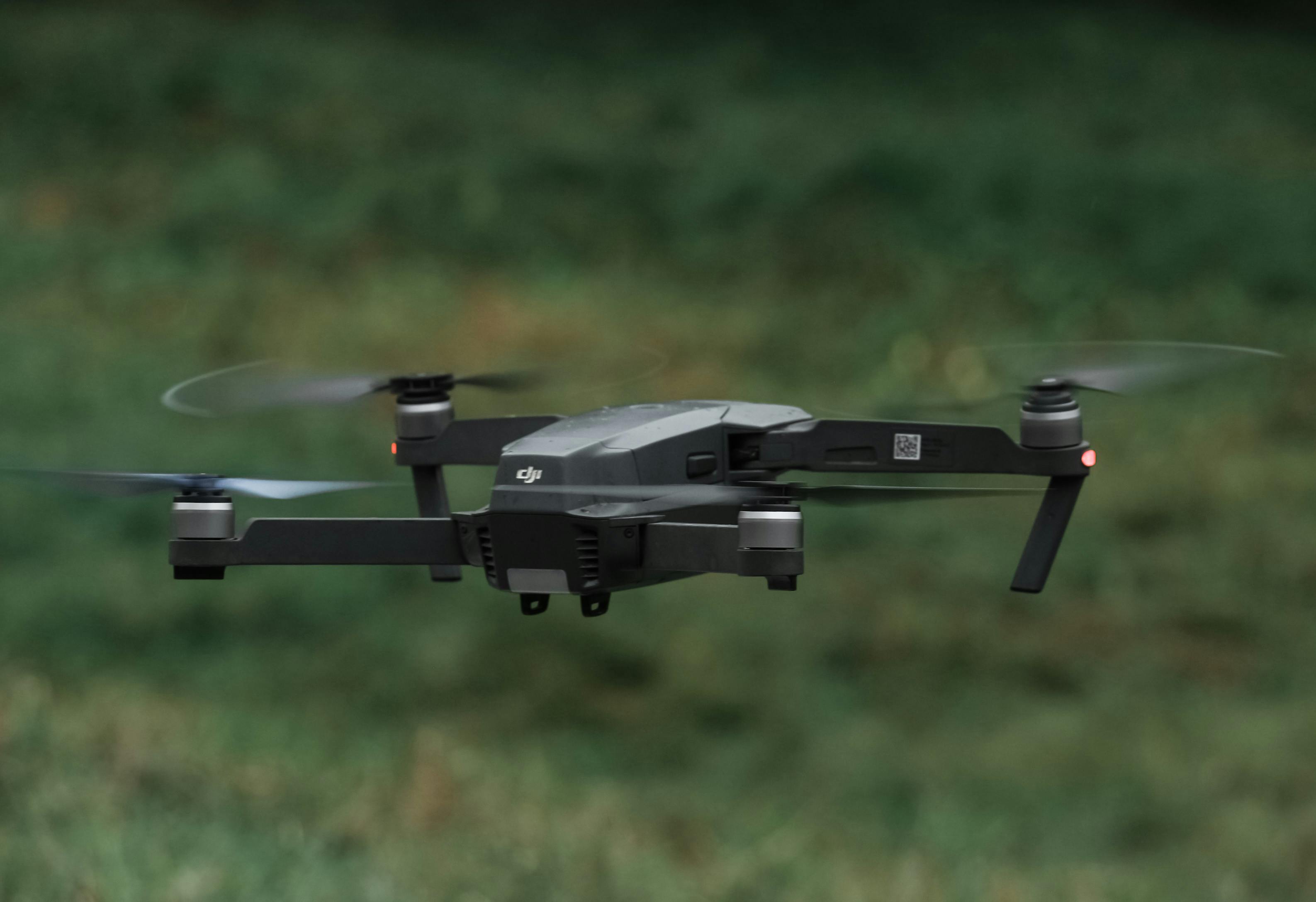 Flying White Drone · Free Stock Photo