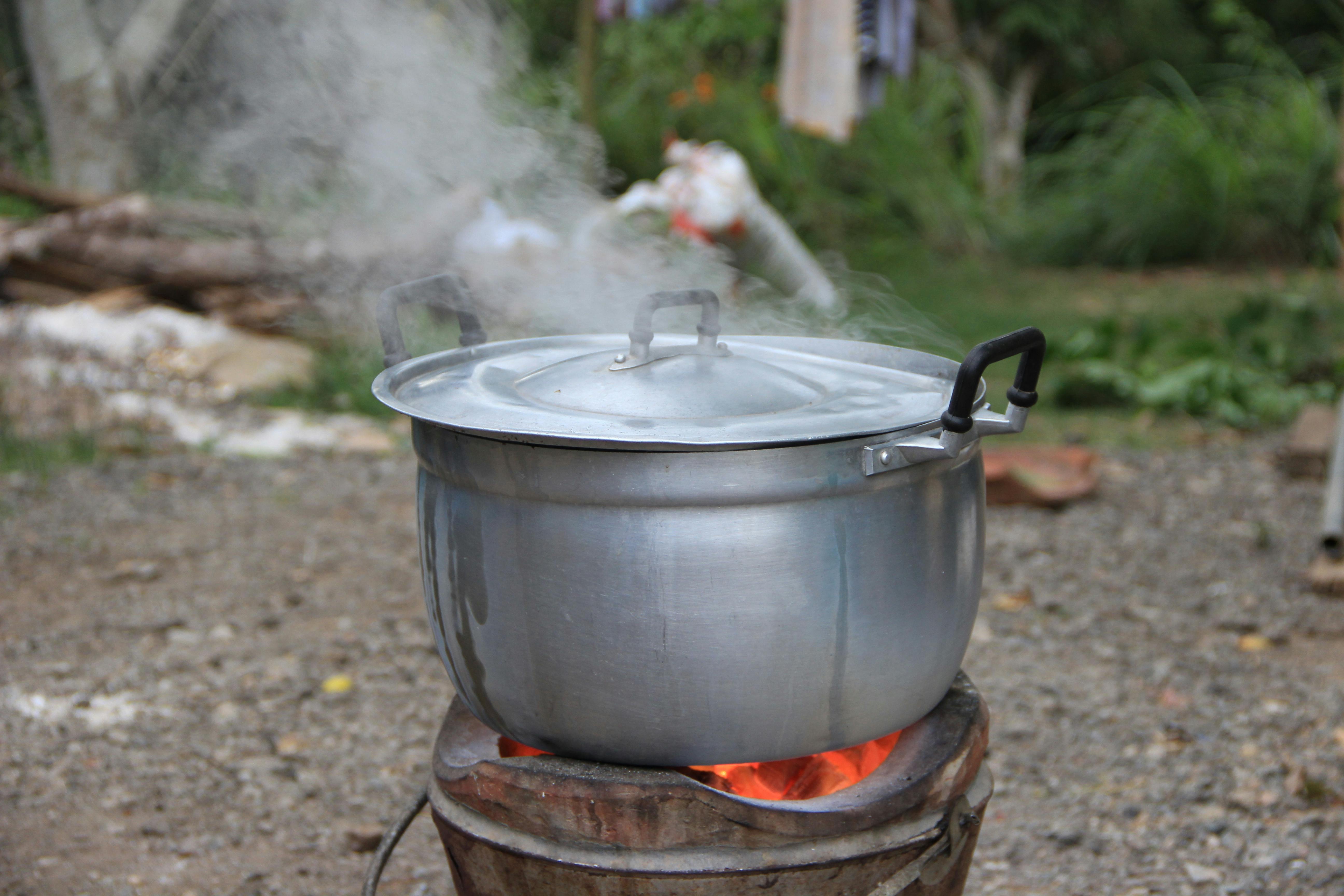 Close-up of Cauldron Boiling on Campfire · Free Stock Photo