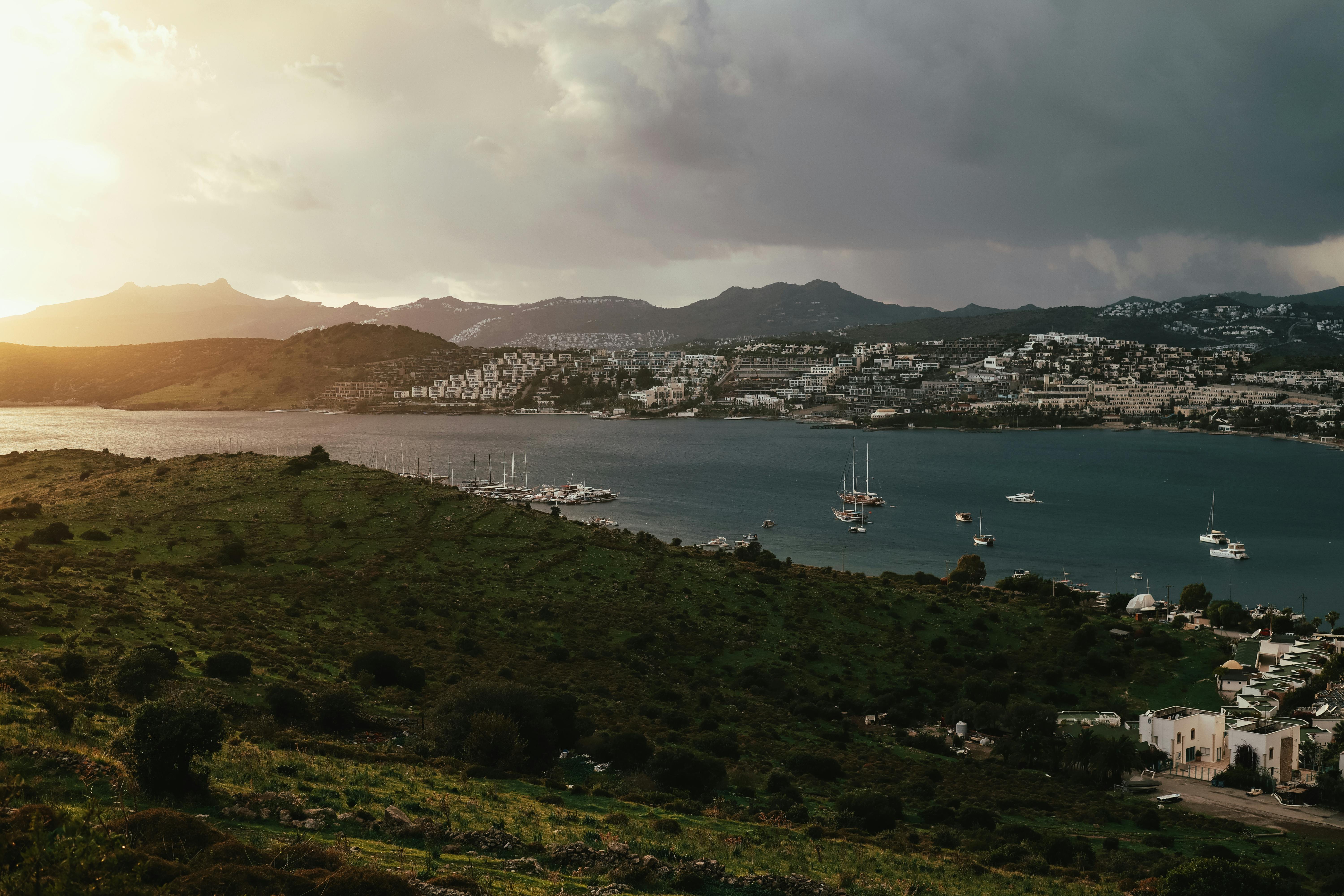 Aerial View of City Buildings Across the Ocean · Free Stock Photo