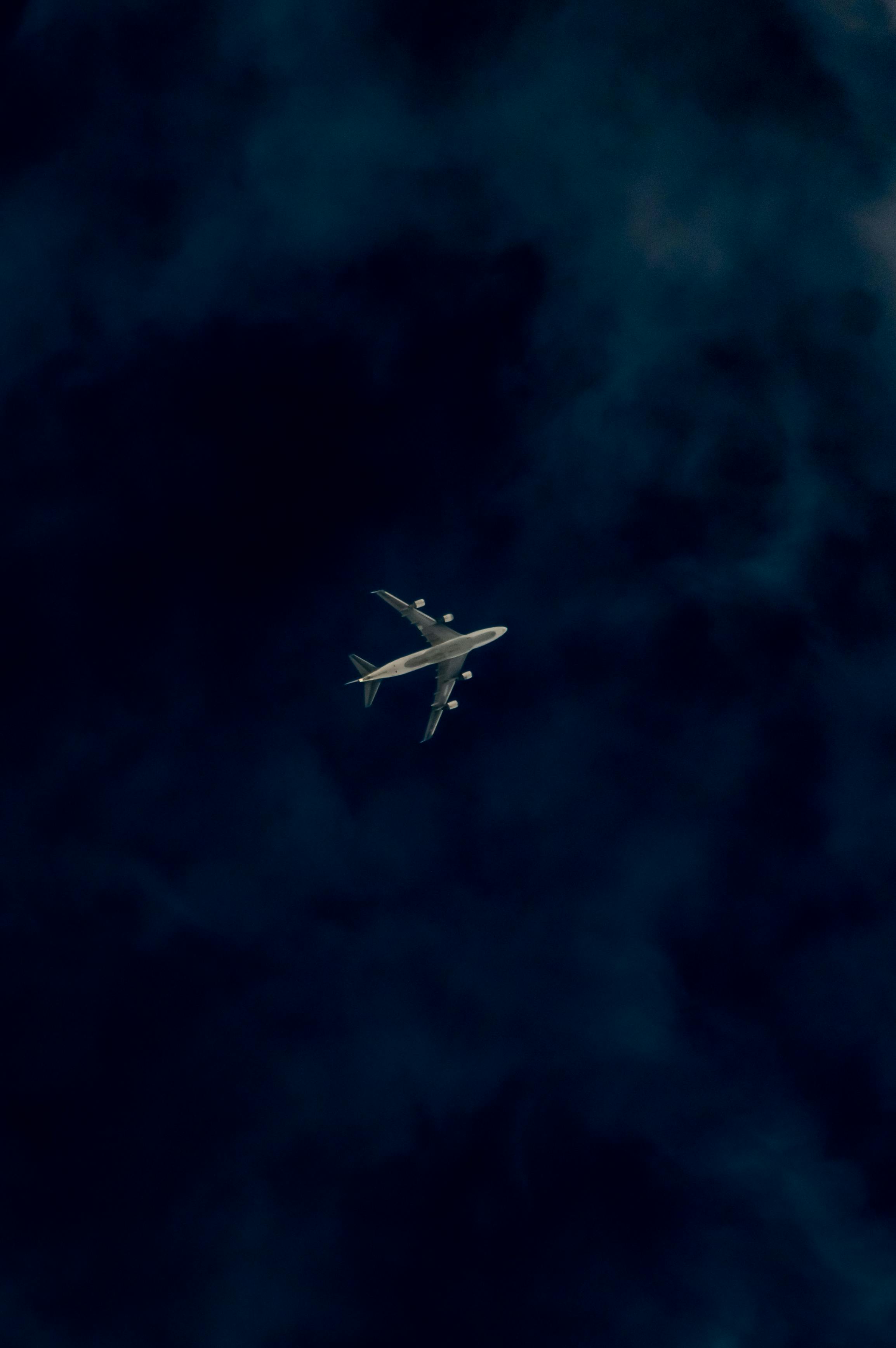 White Airplane in Mid Air · Free Stock Photo