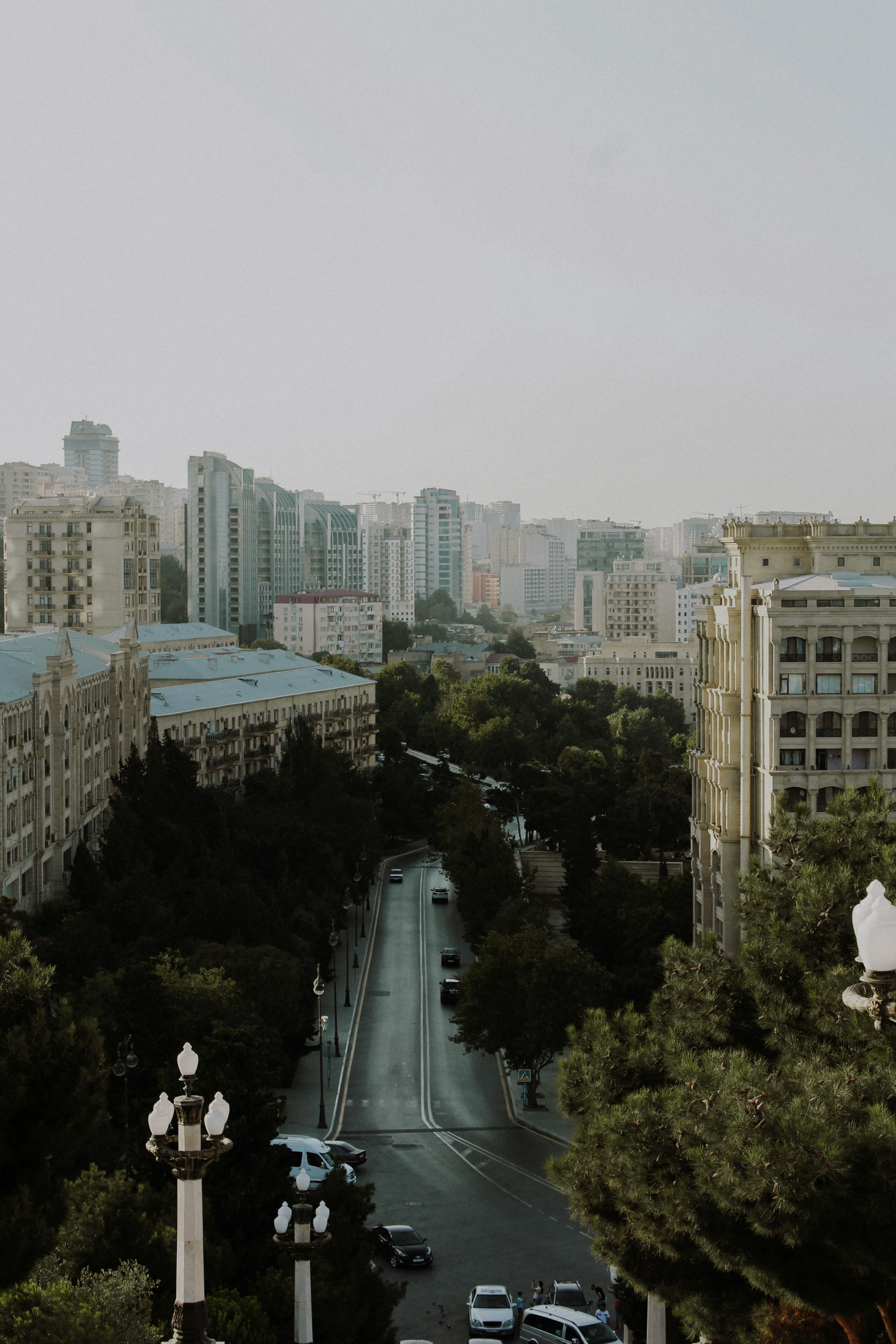 An Aerial Photography of Minor Mosque Near the City Buildings · Free ...