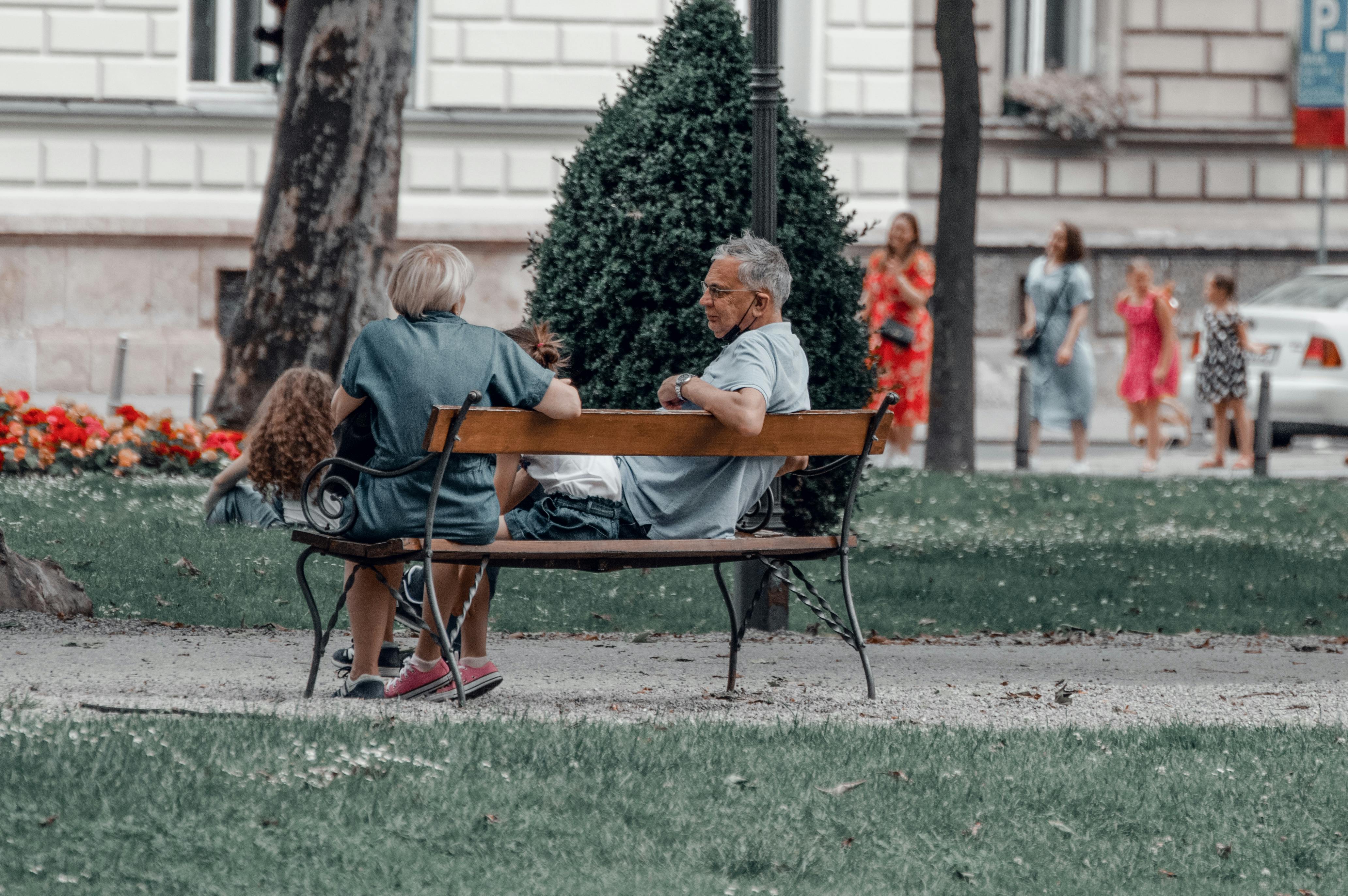 Photo of Woman Sitting on Bench · Free Stock Photo
