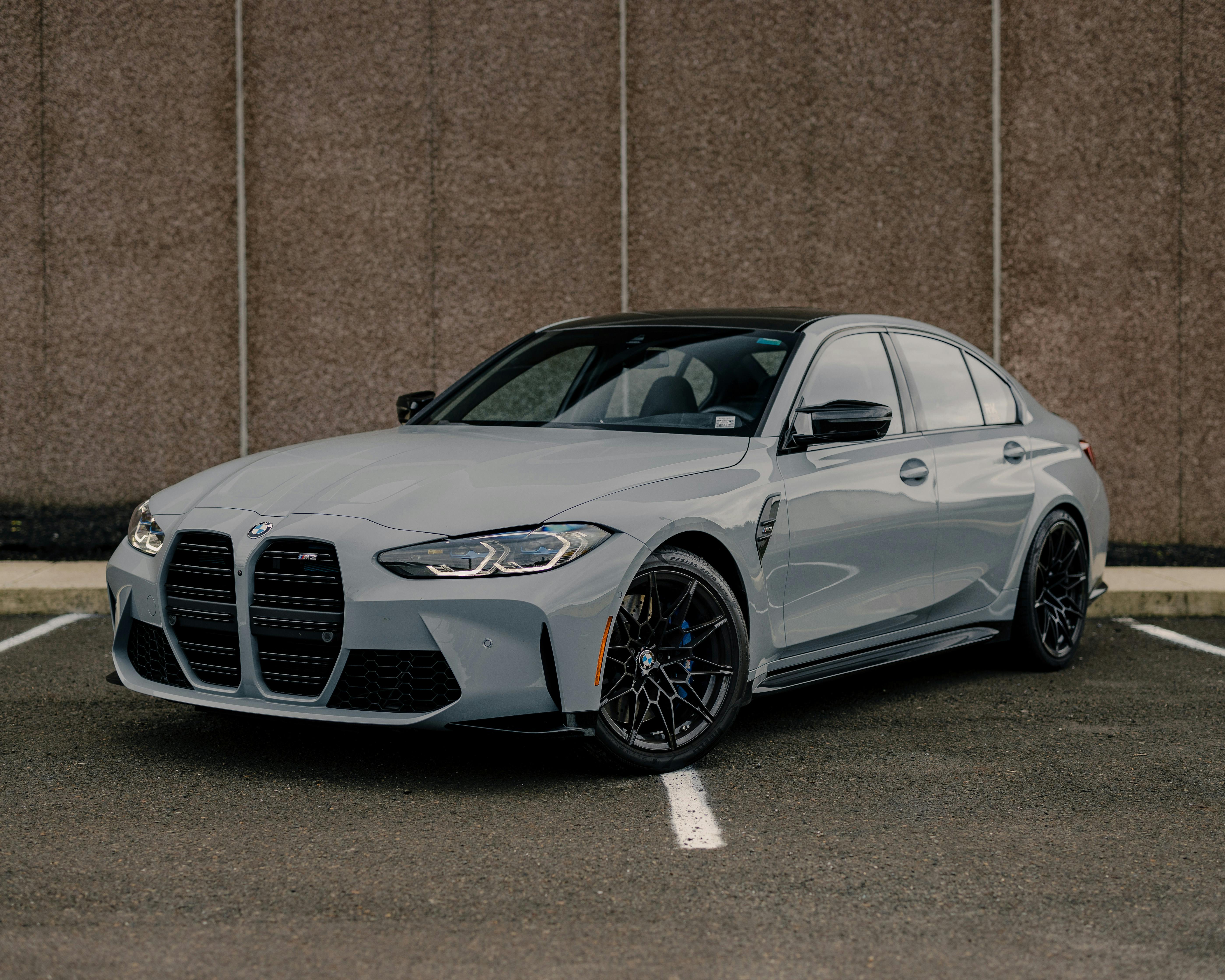 Gray Car Parked at the Parking Lot · Free Stock Photo