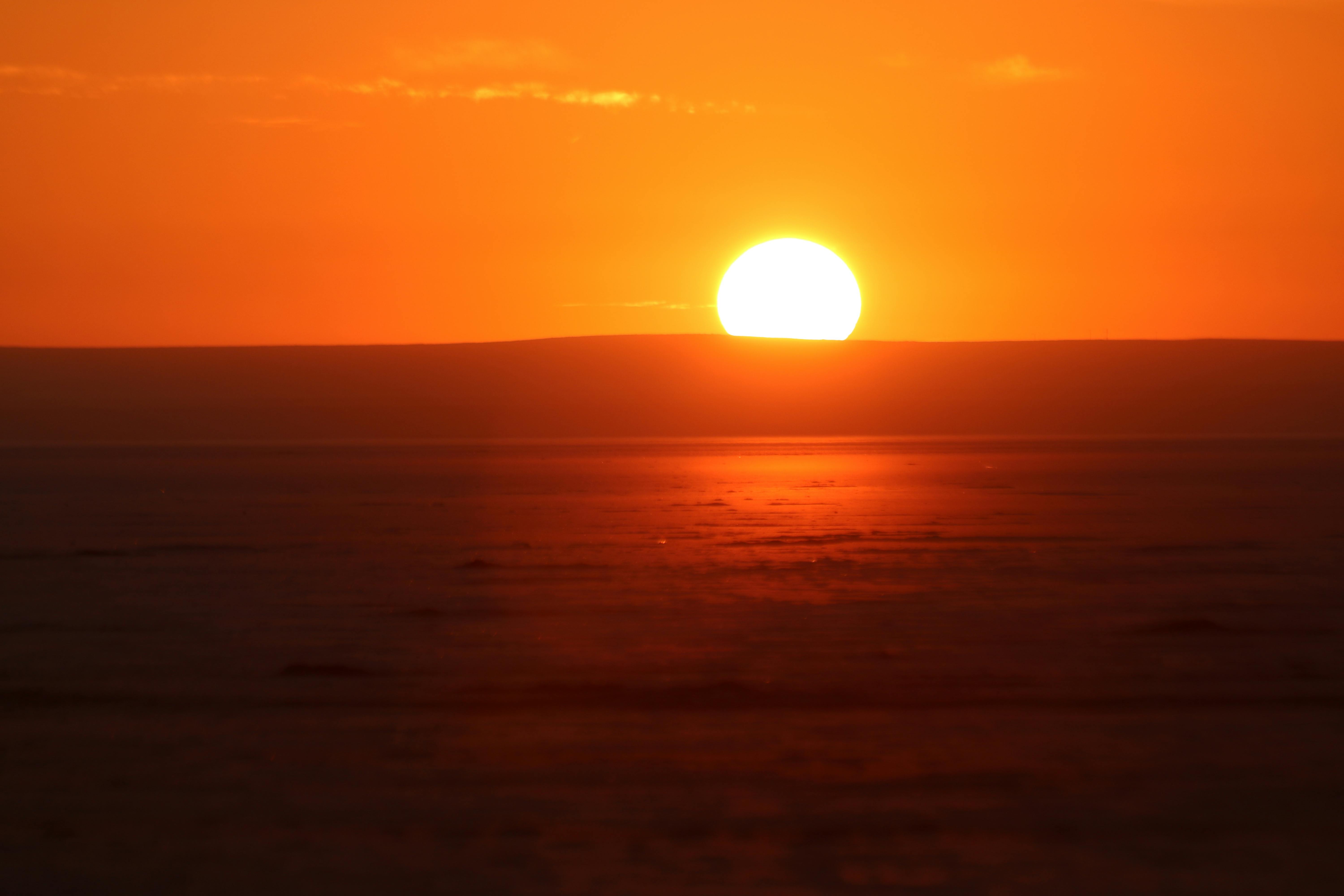 Sunset over the Sea With Clouds · Free Stock Photo