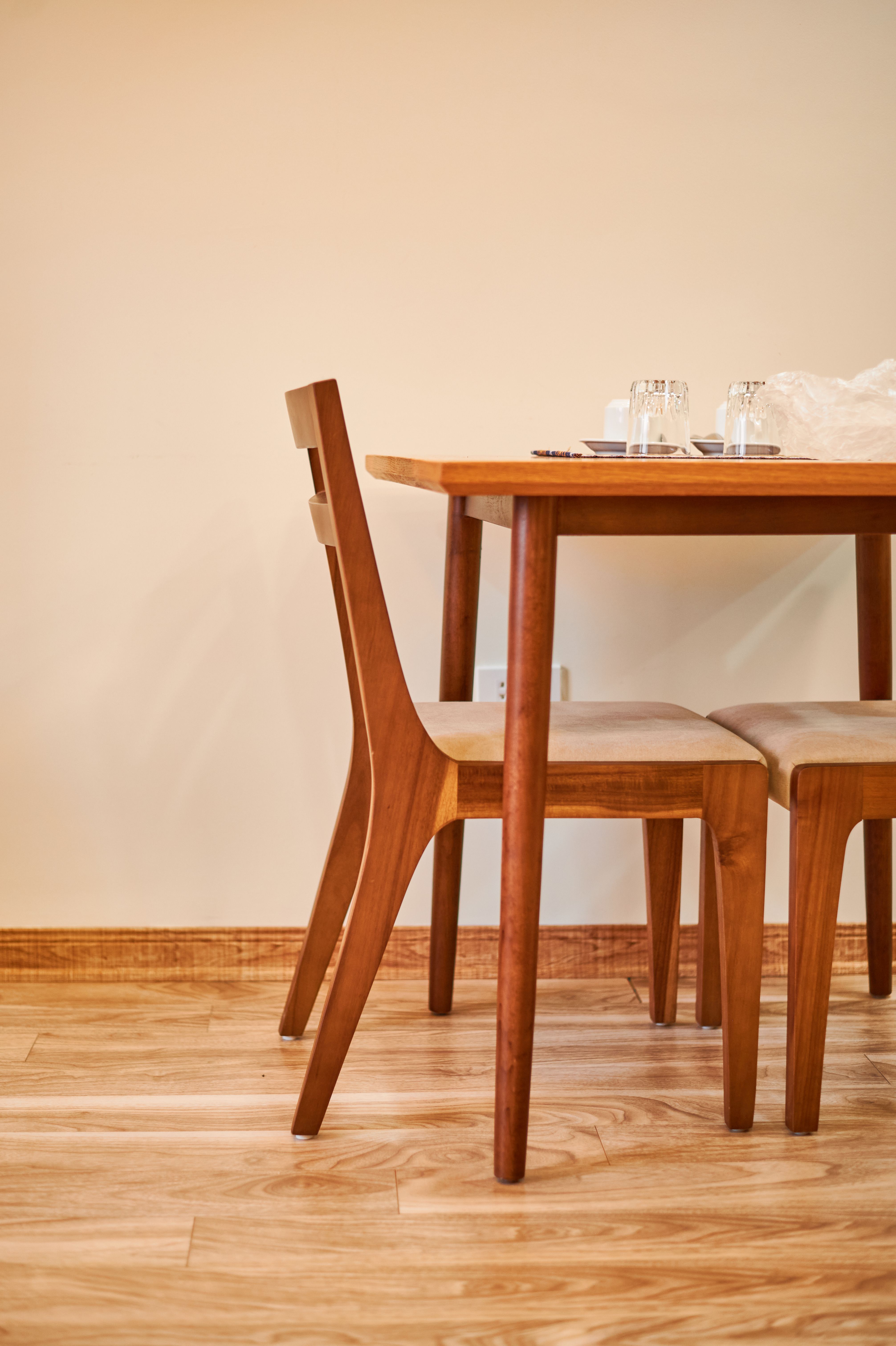 Green Chair Beside Brown Wooden Table · Free Stock Photo