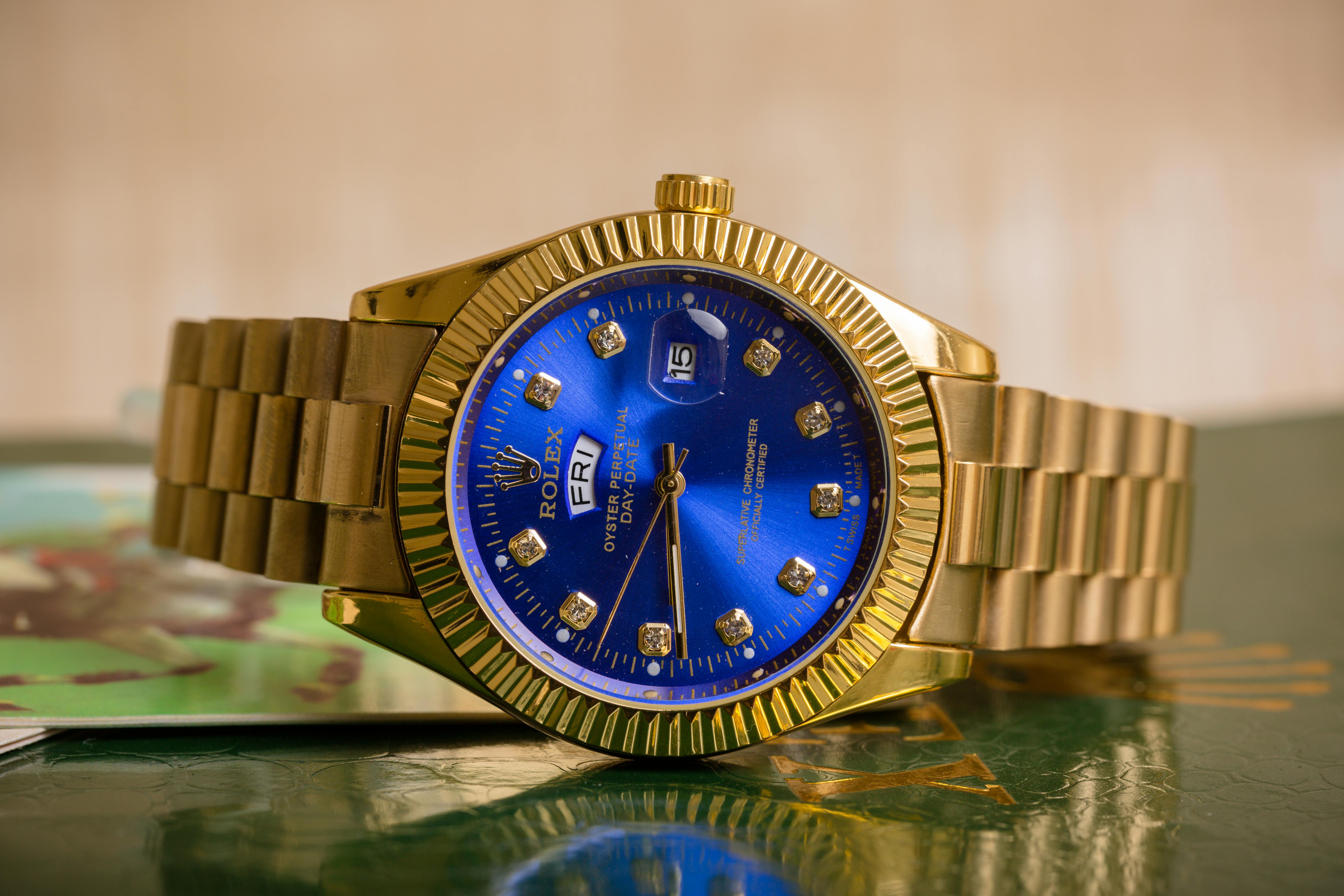 Holding a Rolex Watch · Free Stock Photo