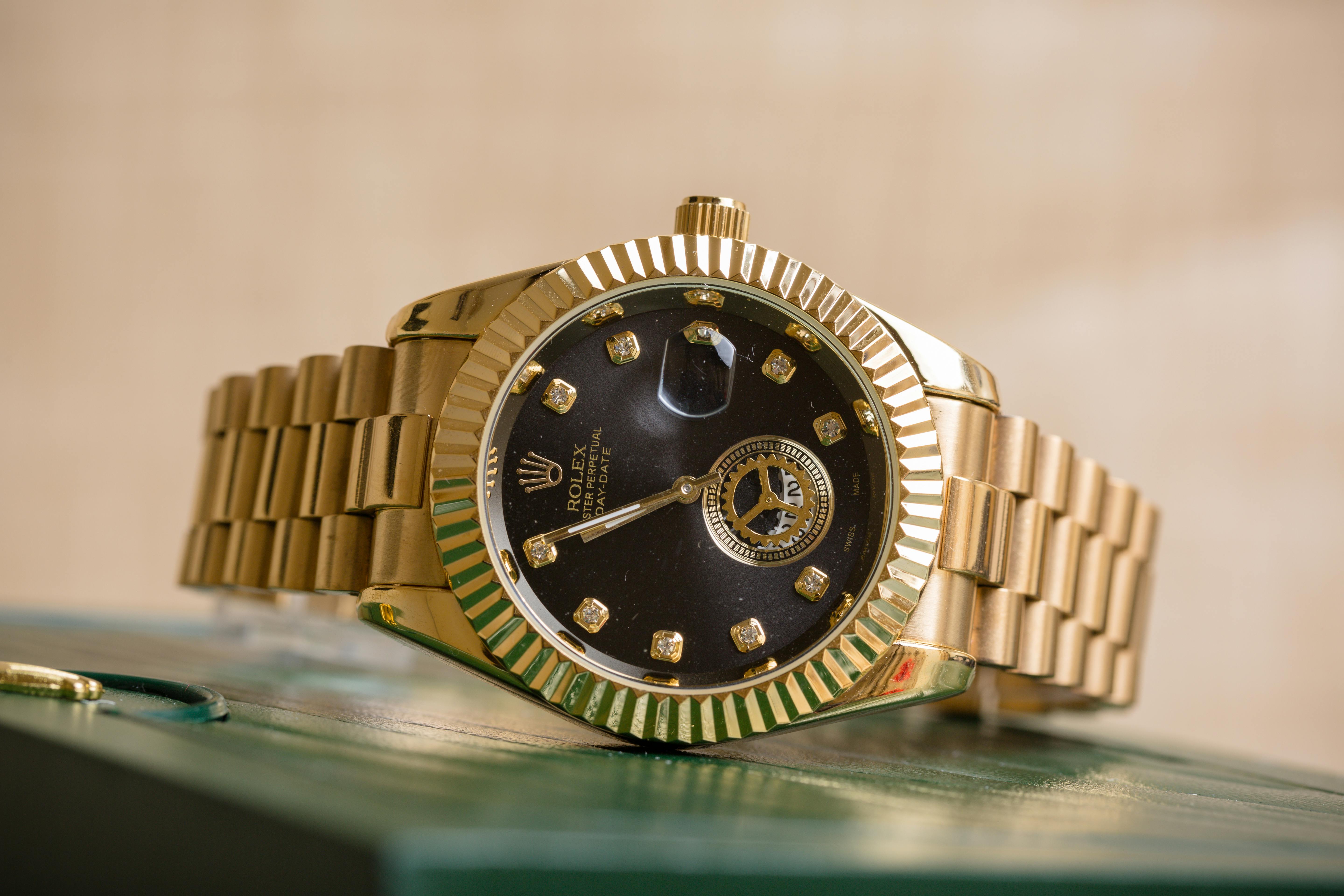Holding a Rolex Watch · Free Stock Photo
