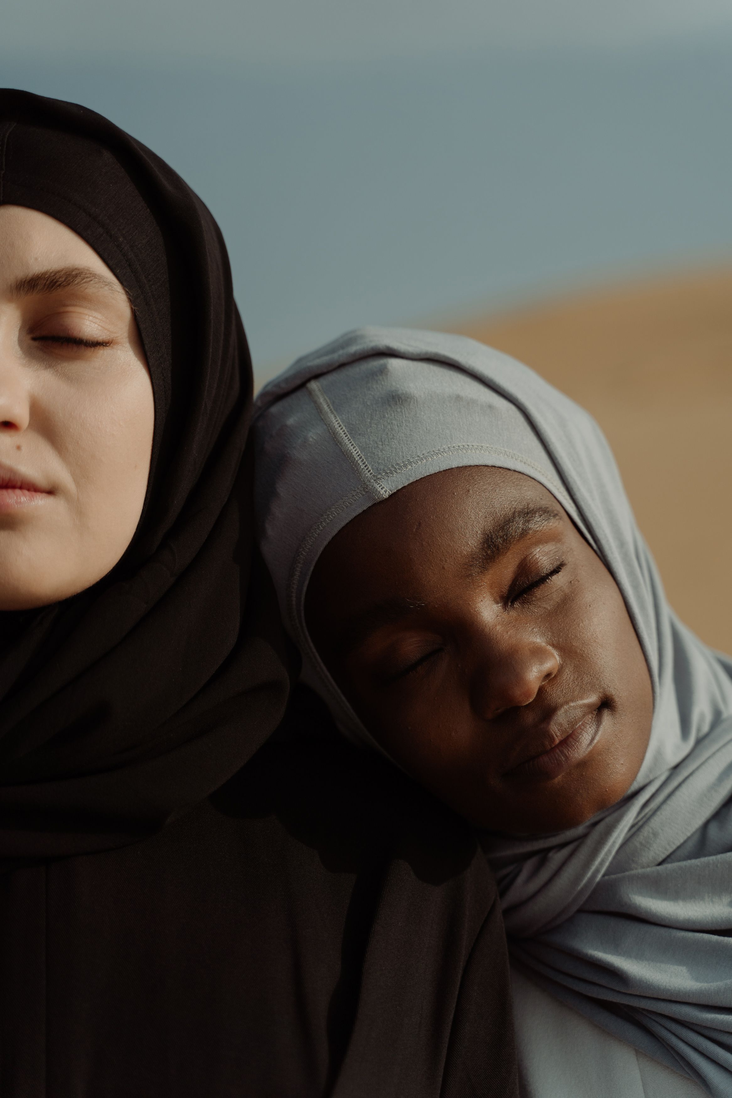 Women in Hijab Standing Close to Each Other · Free Stock Photo