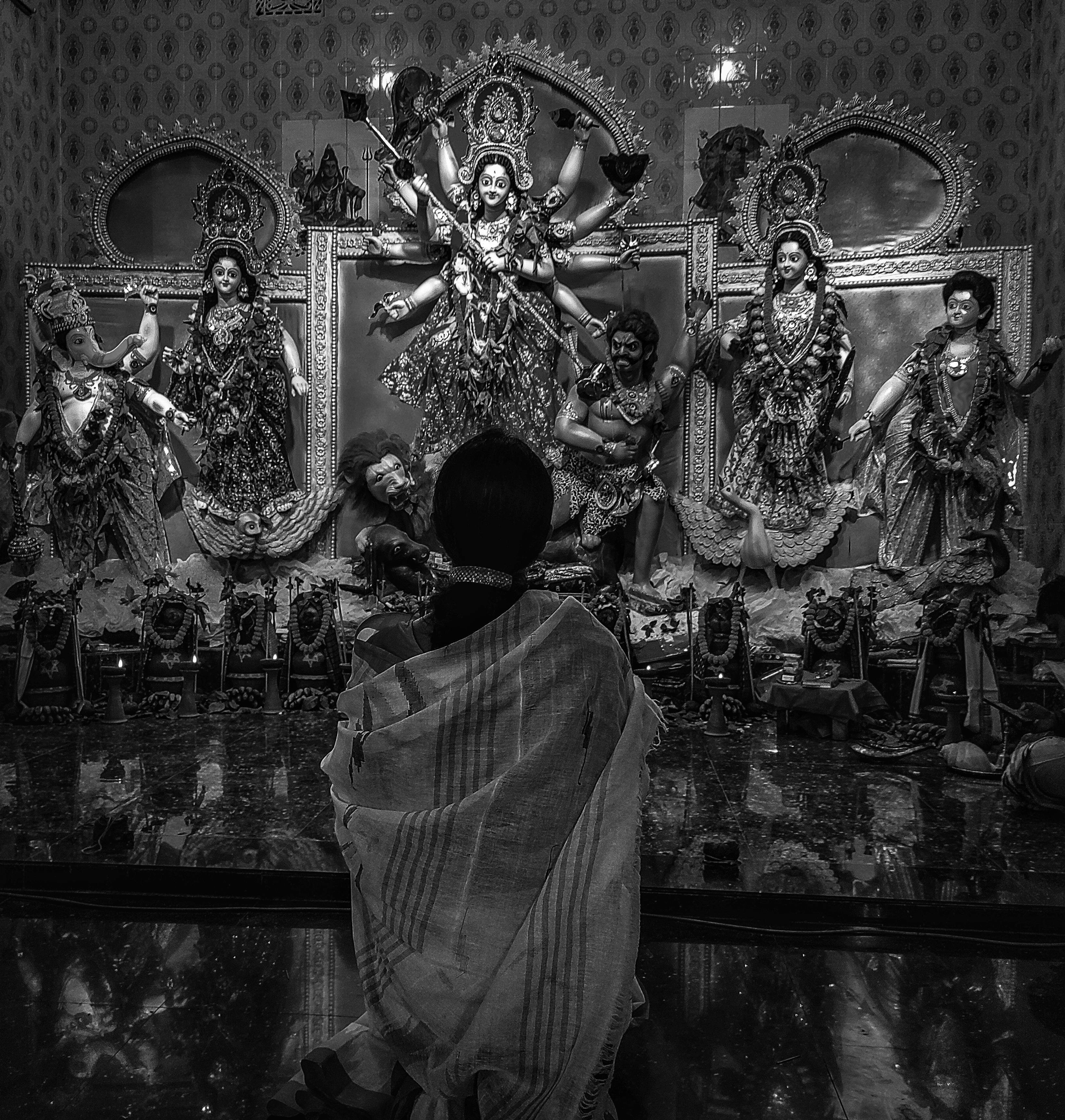 Grayscale Photo of a Person inside an Indian Temple · Free Stock Photo