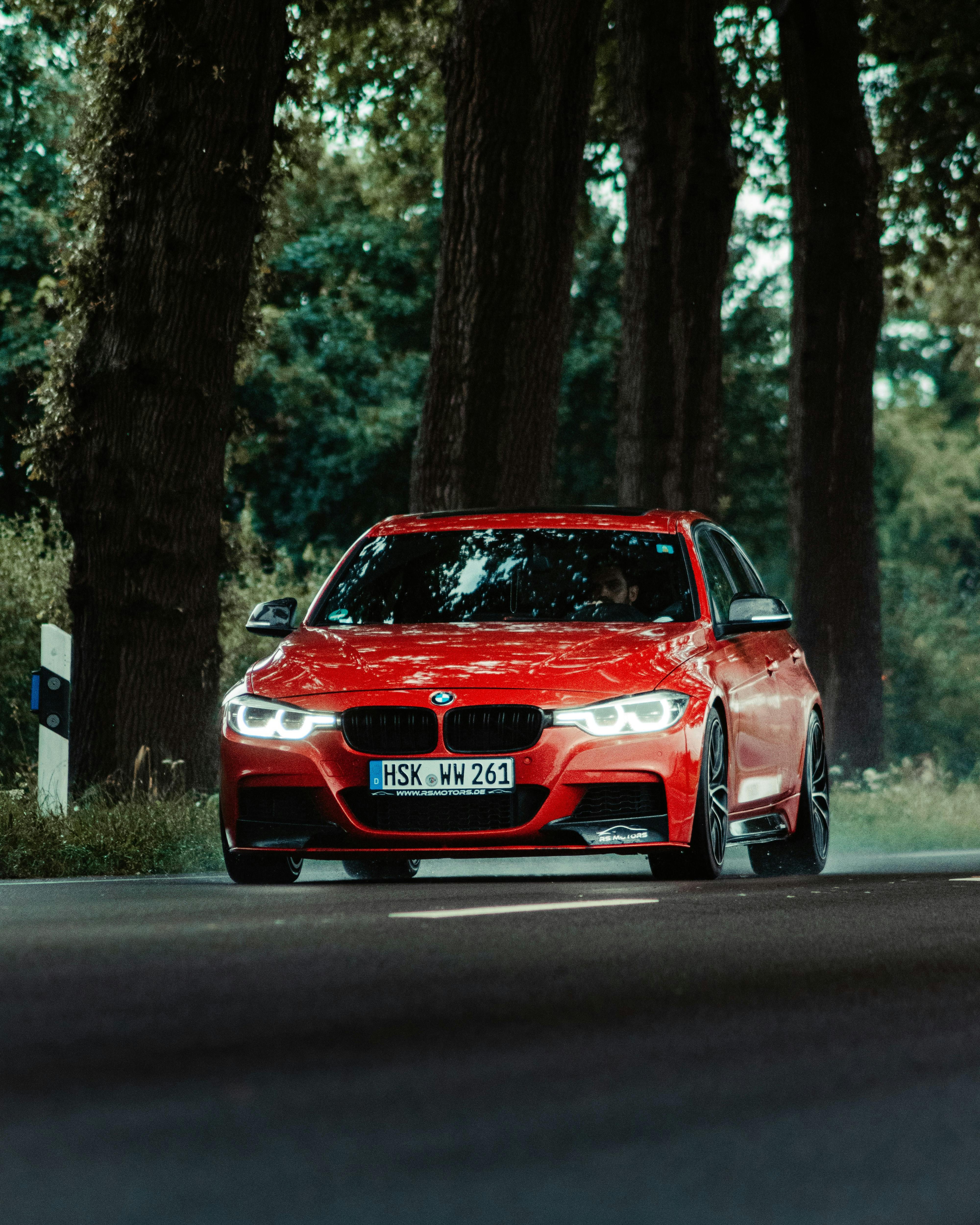 A Red BMW on the Road · Free Stock Photo