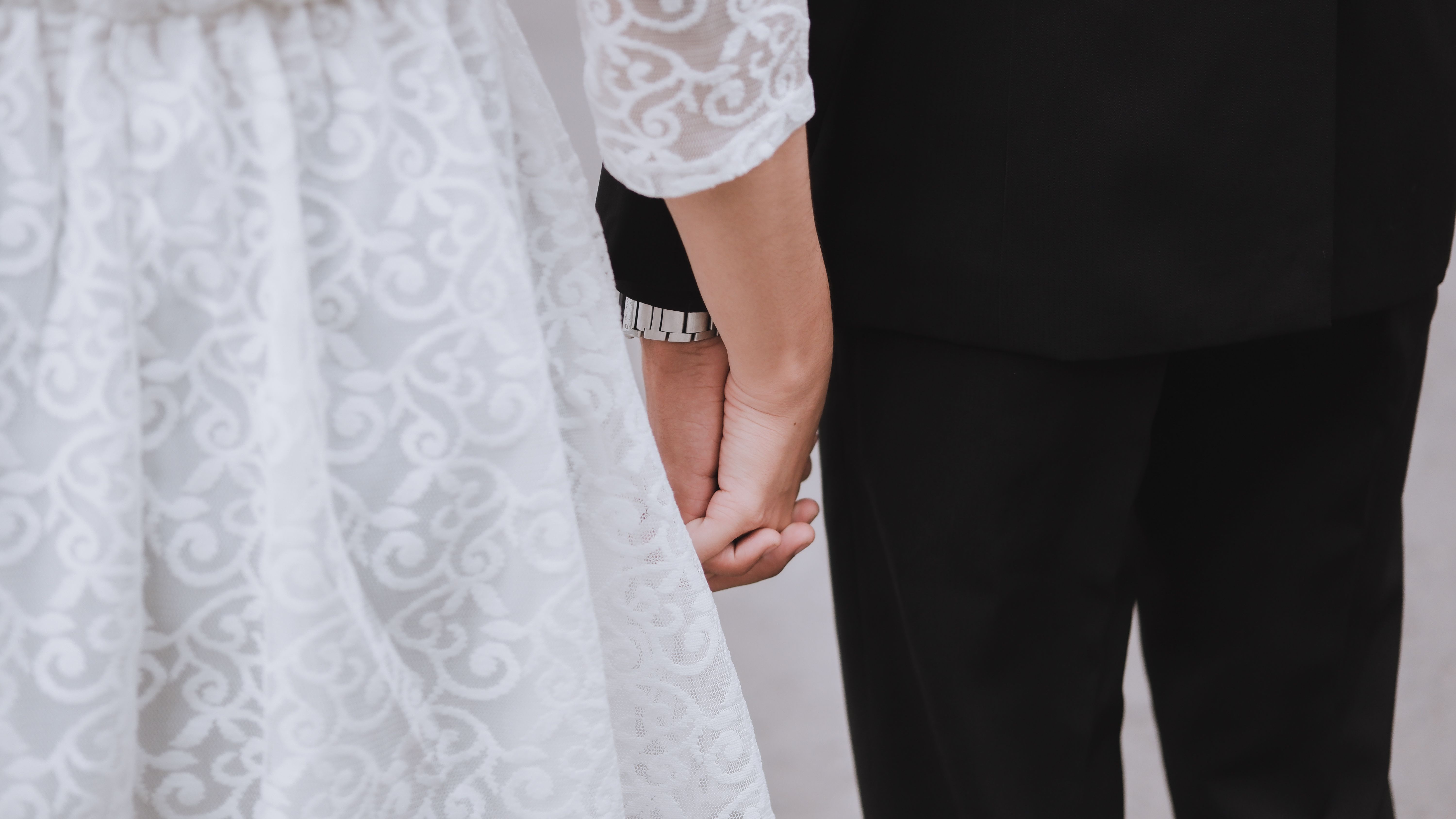 Little Girl and the Bride Holding Hands before the Wedding Ceremony ...