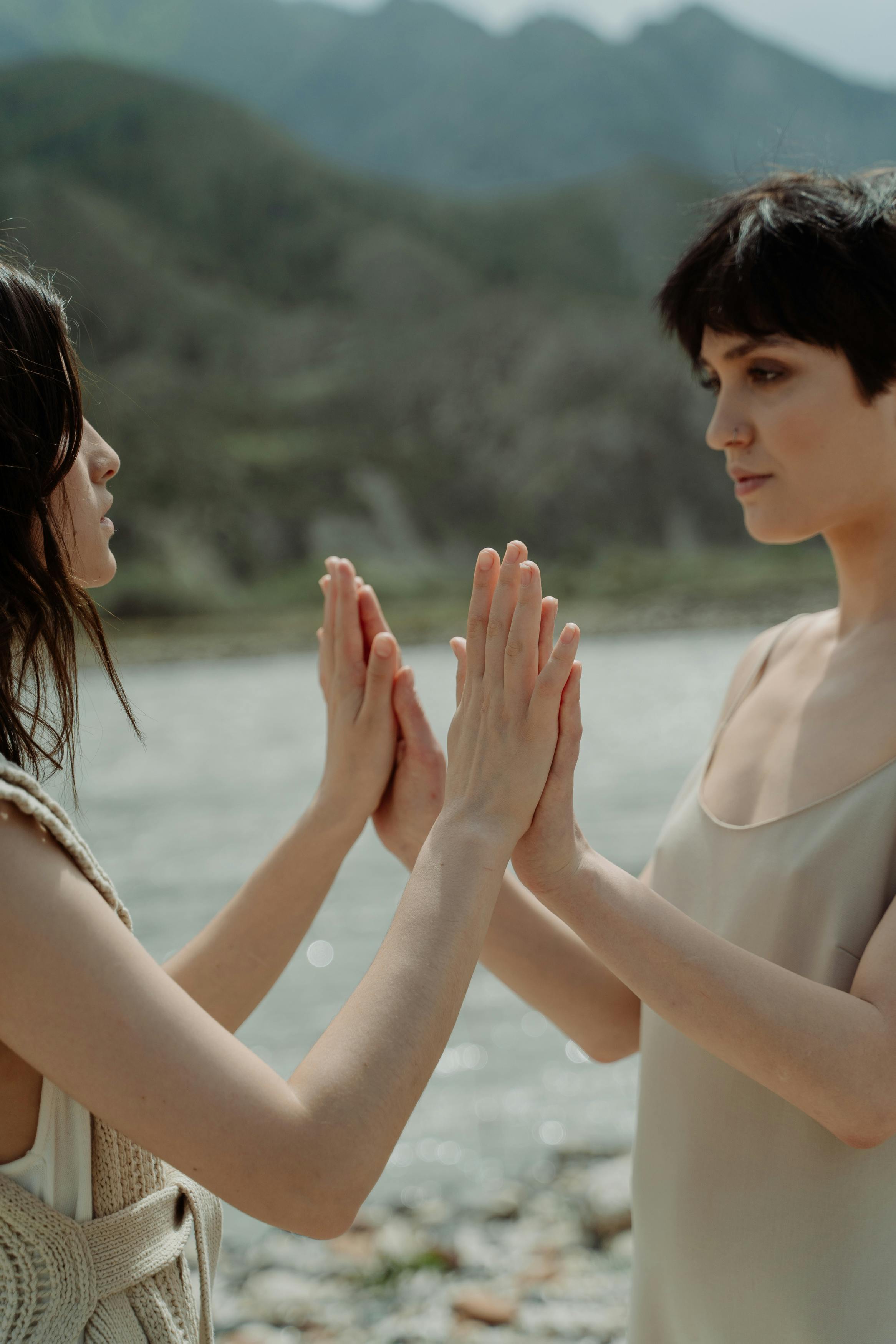 Women with Their Hands Together · Free Stock Photo