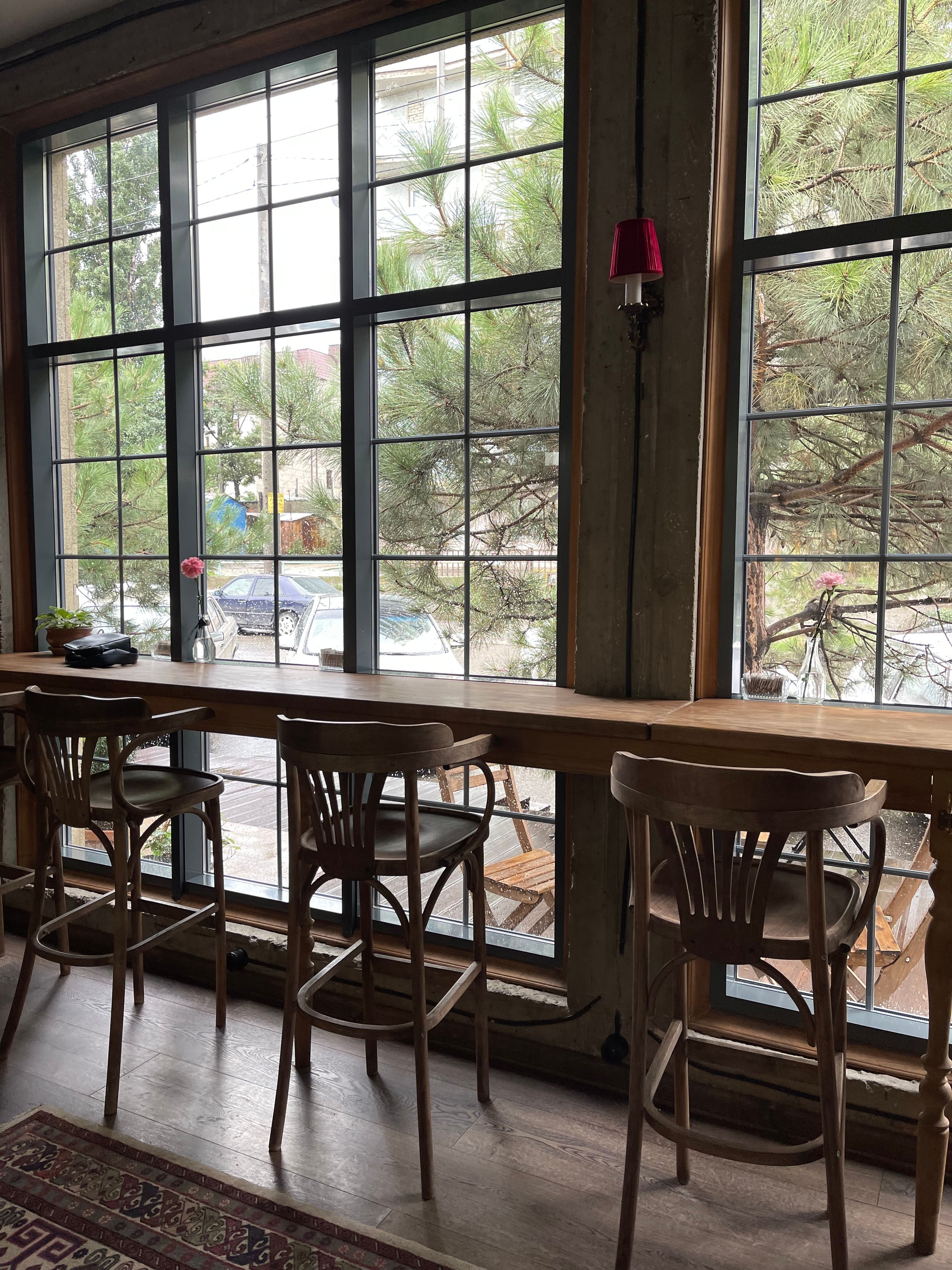 Bar Stools along Windows · Free Stock Photo