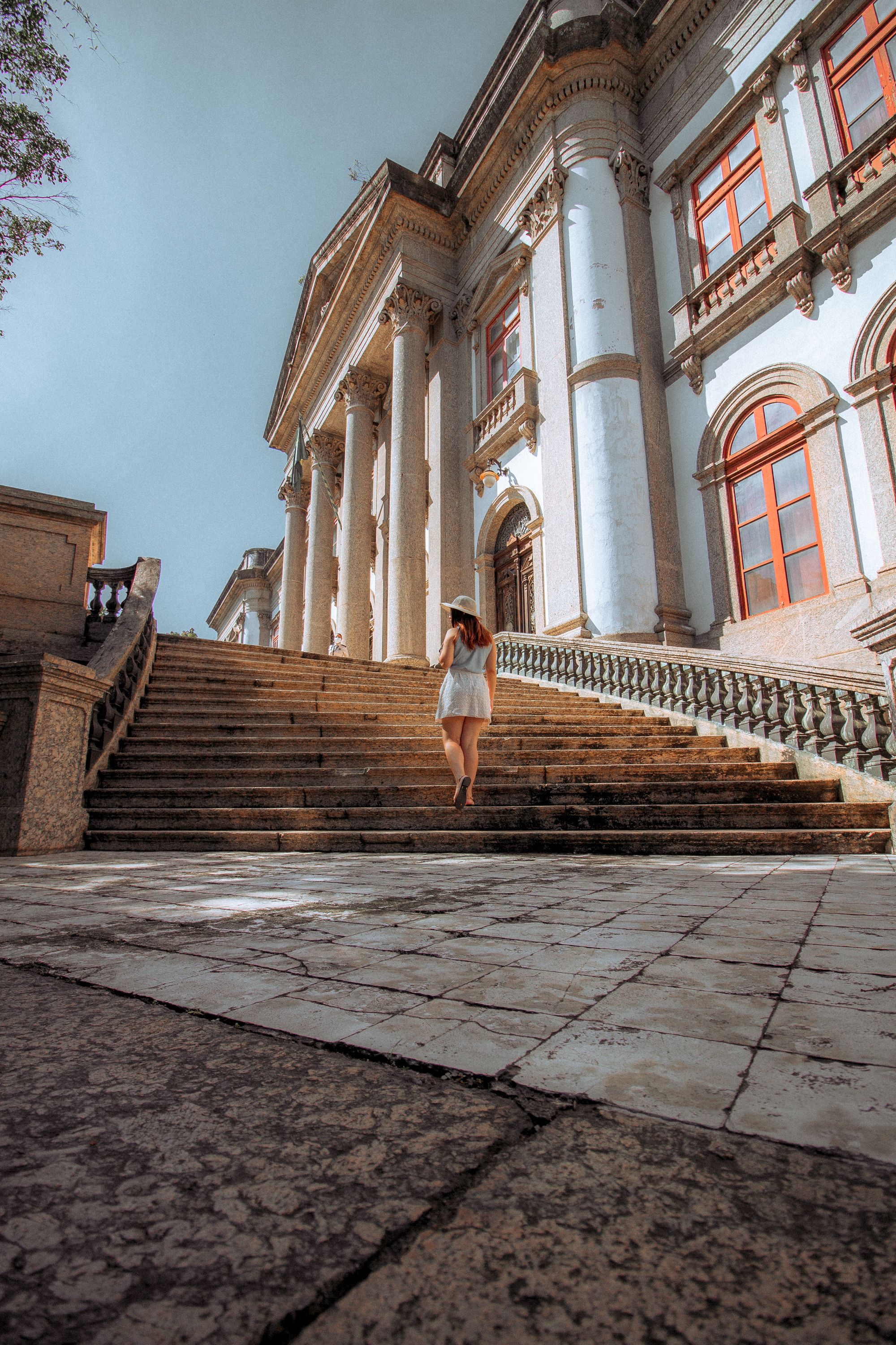Woman in Dress Going Up the Stairs · Free Stock Photo