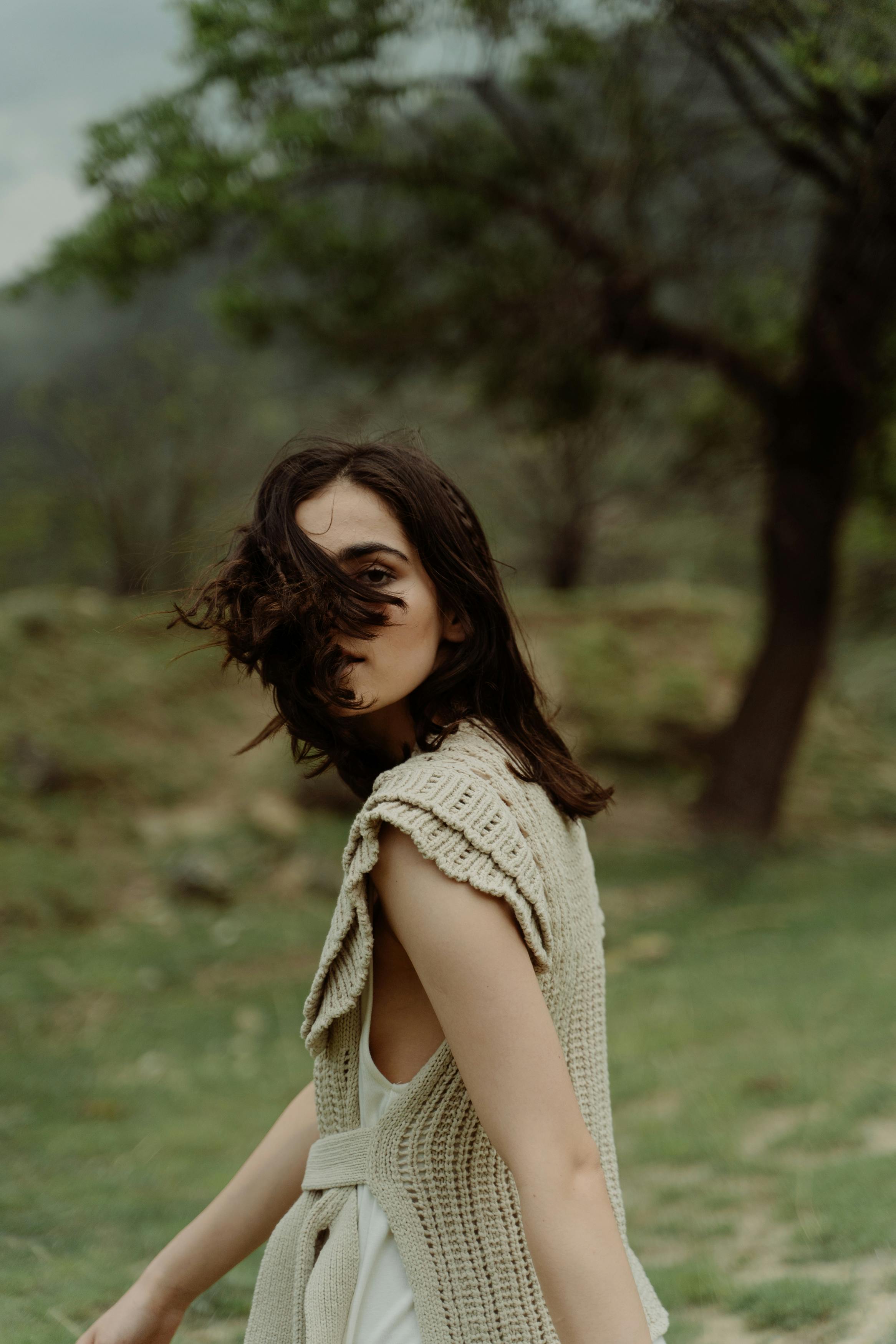 Woman Looking Over Shoulder Walking