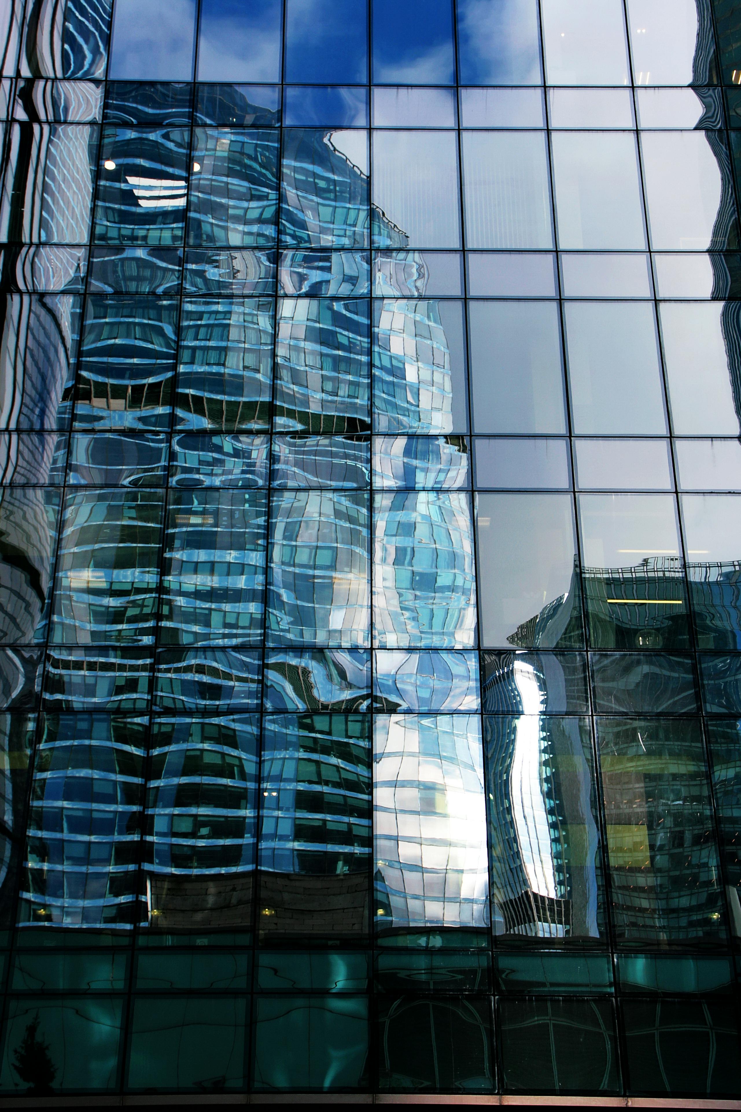 Cloud in Sky and Building · Free Stock Photo