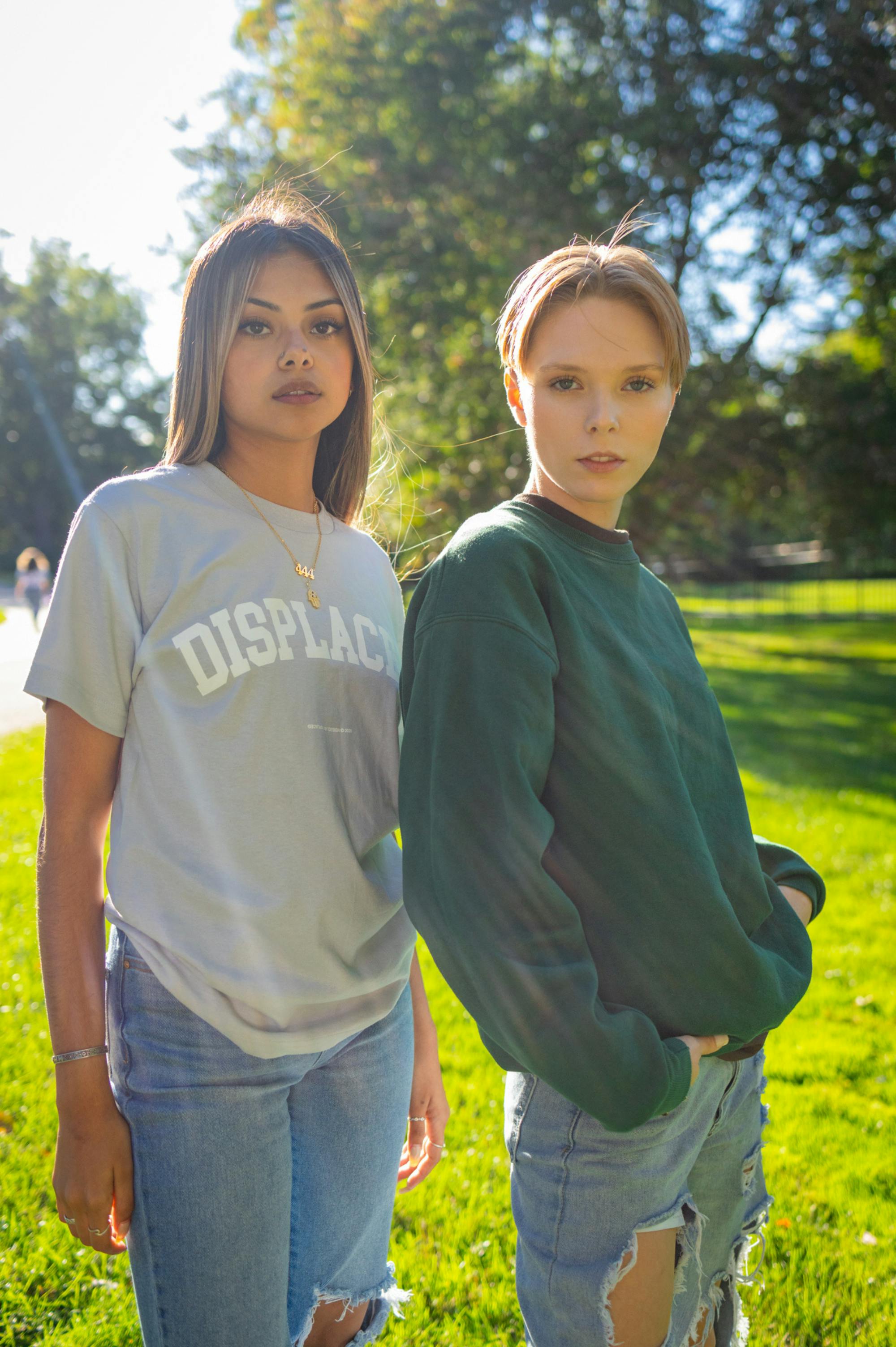 Two Women holding Clothes · Free Stock Photo