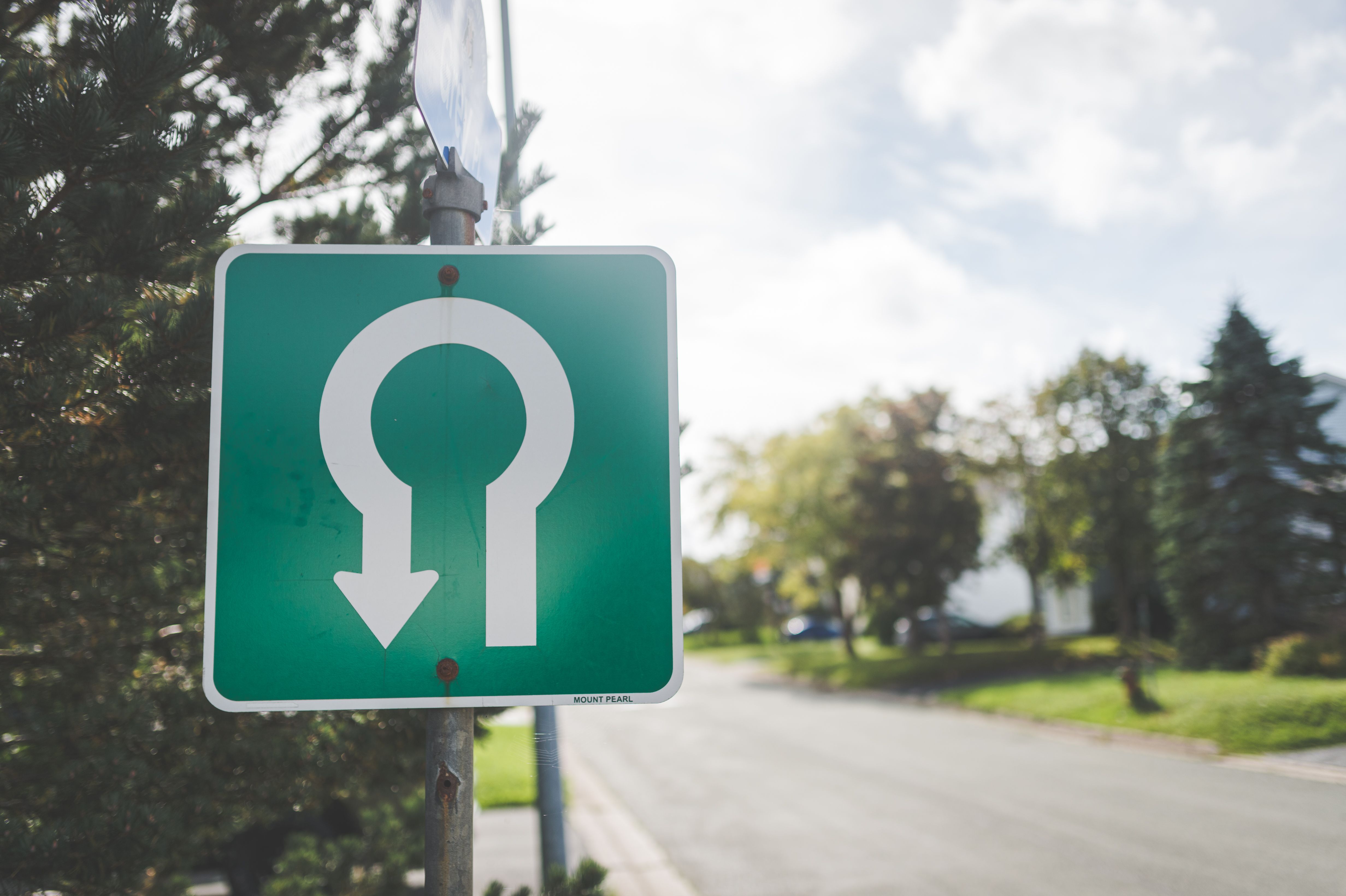 Green and White Road Sign · Free Stock Photo
