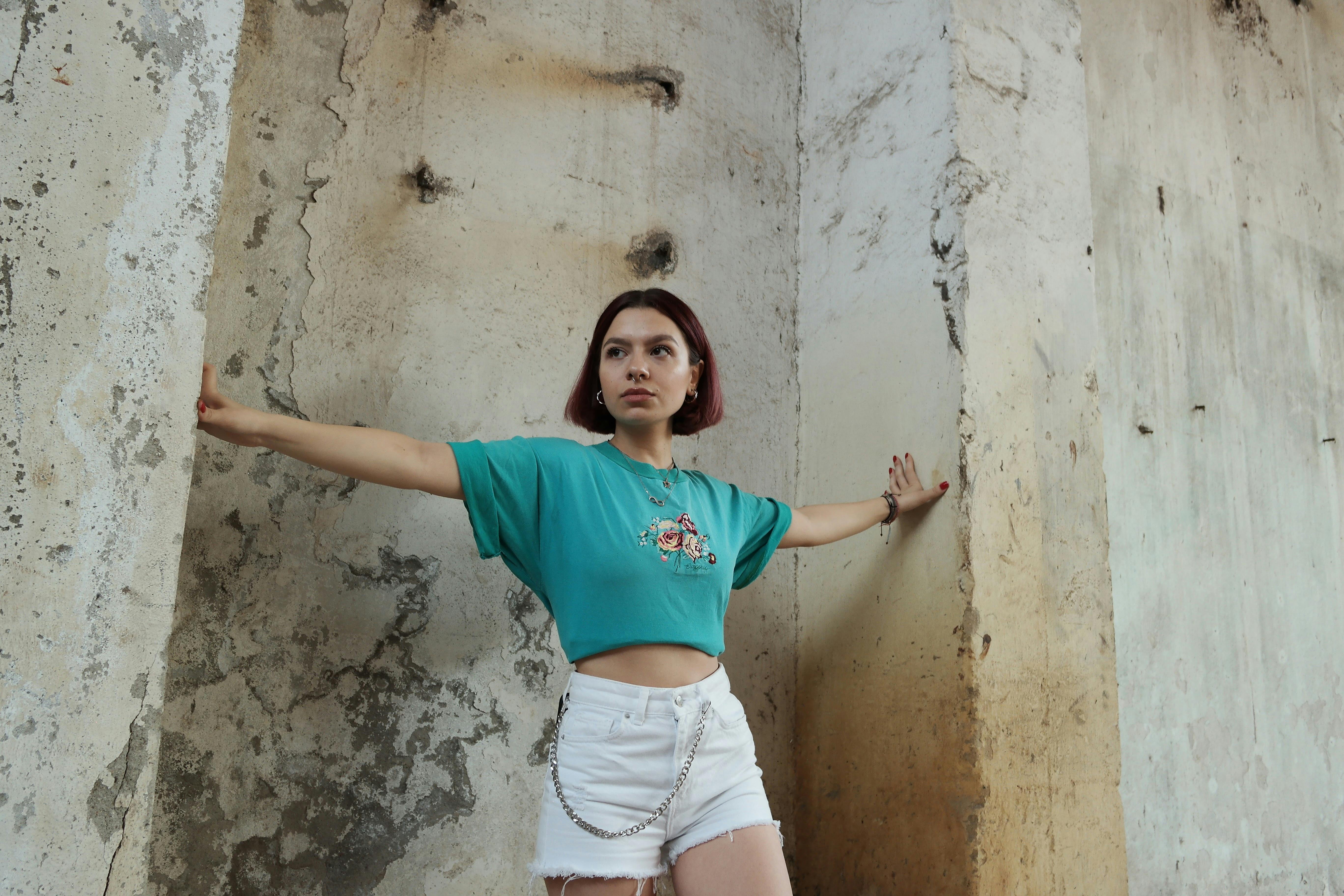 Photo of a Woman in a Green Crop Top Posing · Free Stock Photo