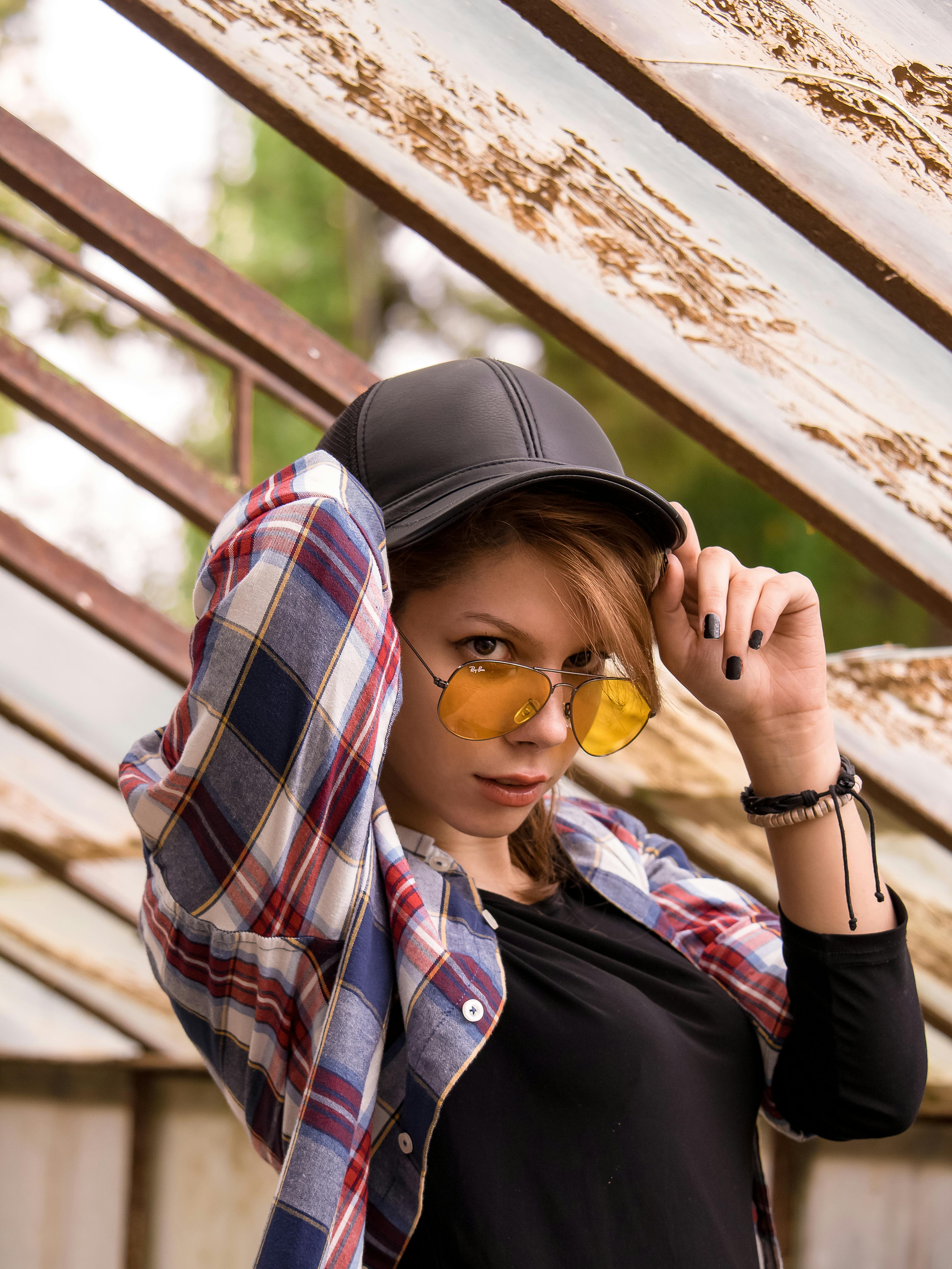 Pretty Woman Wearing a Black Cap · Free Stock Photo