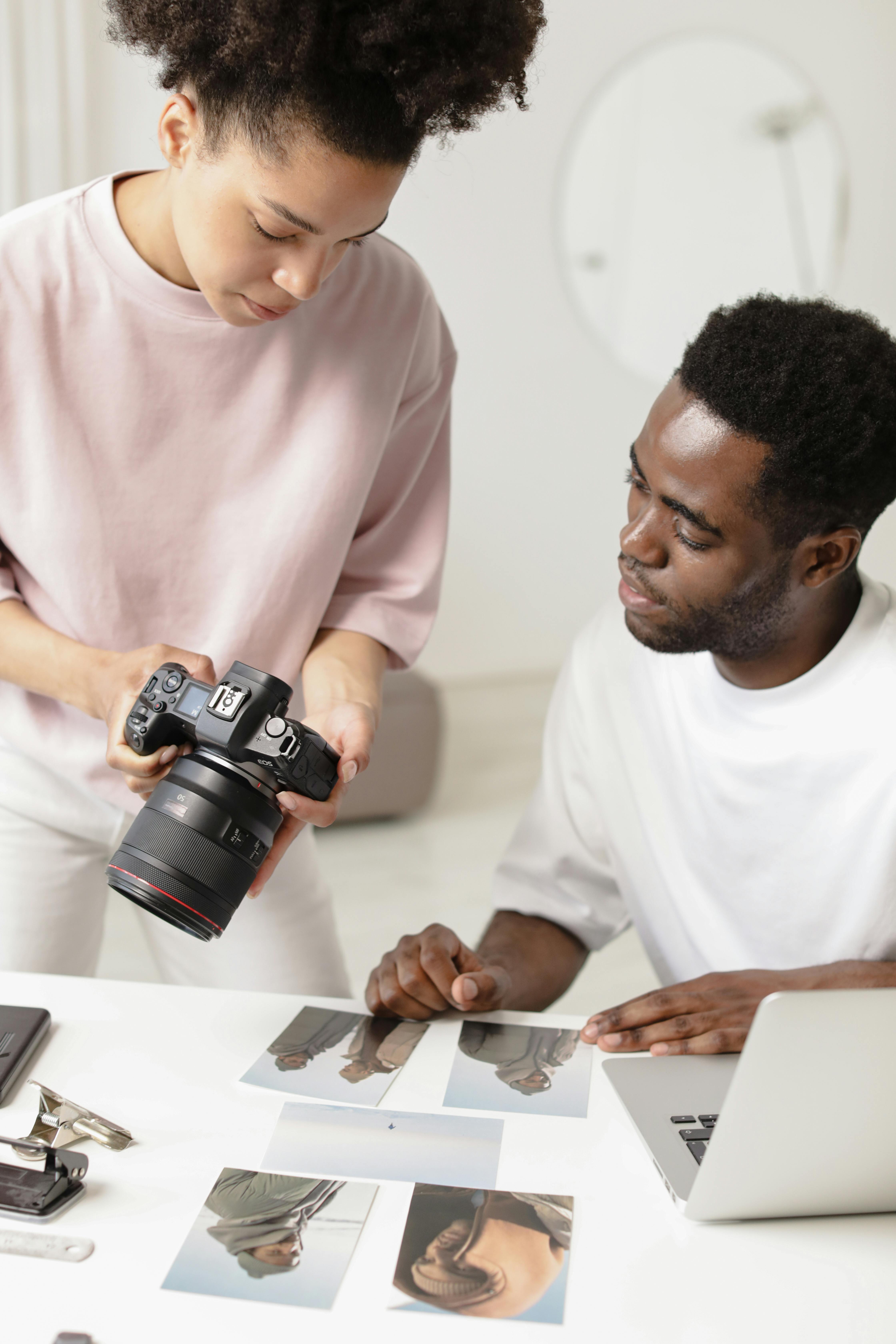 Selective Focus Photography of Man Using Black Dslr Camera · Free Stock ...