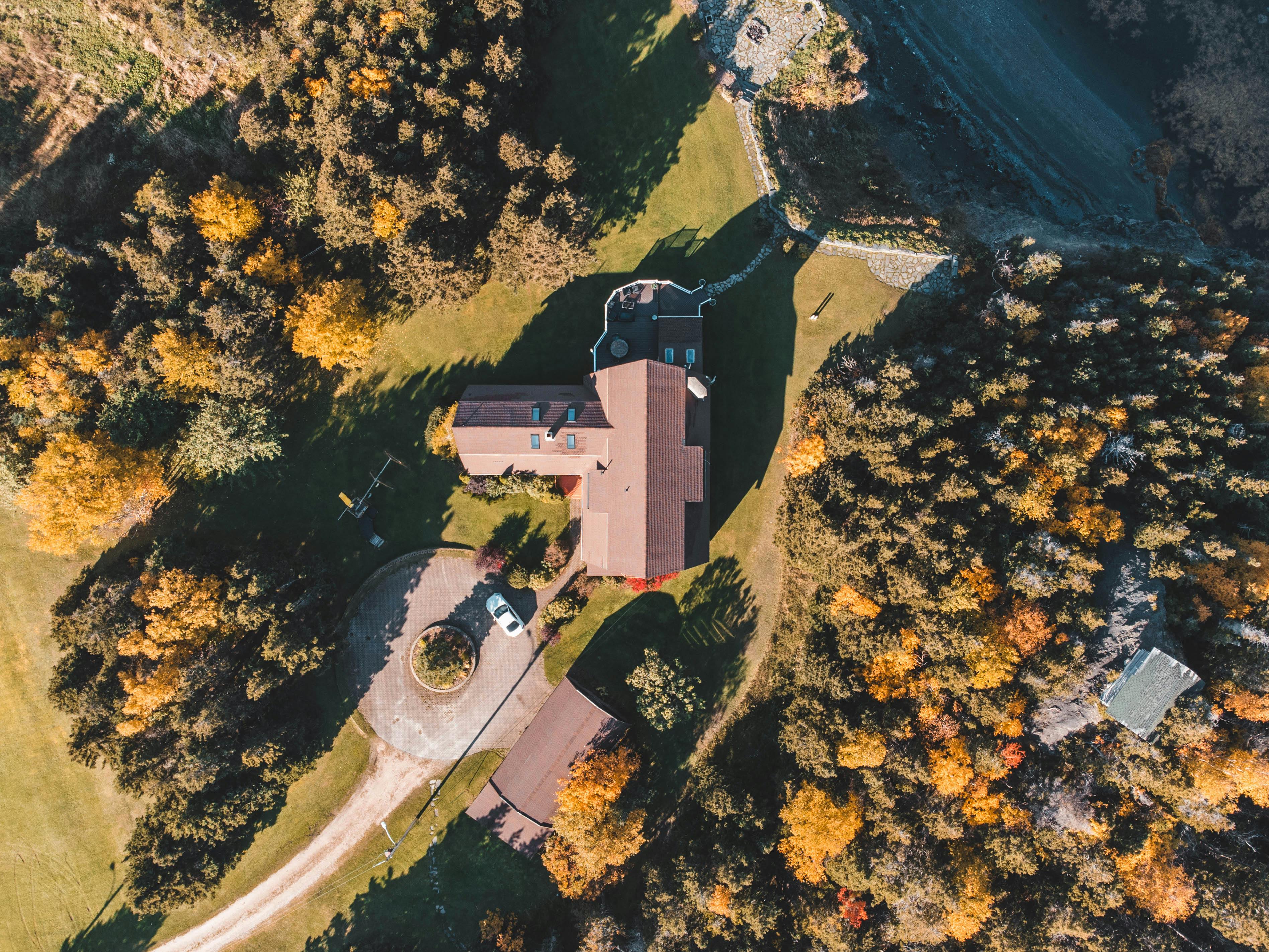 Aerial Shot of Houses Surrounded by Green Grass and Trees · Free Stock ...