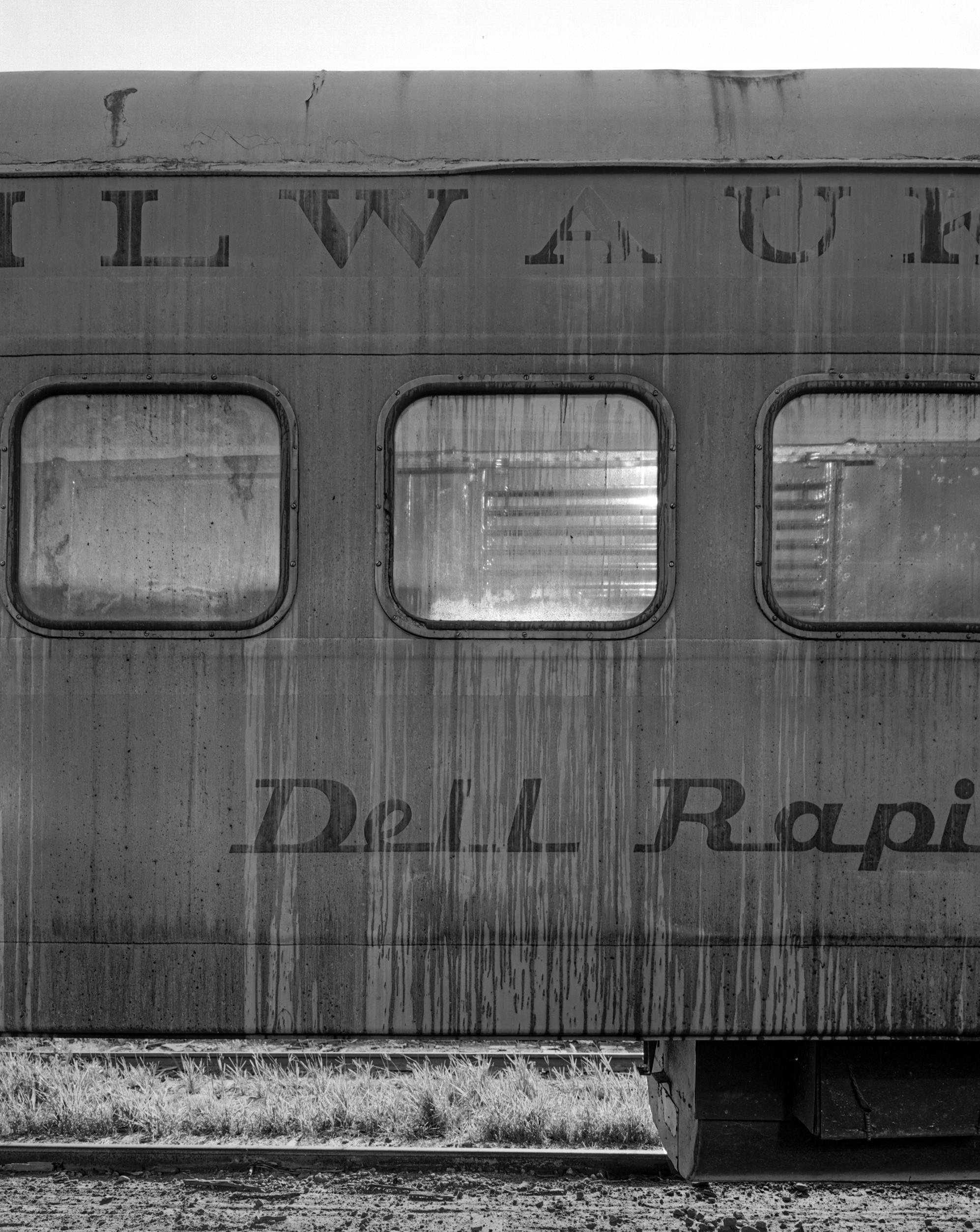 Grayscale Photo of Train Windows · Free Stock Photo